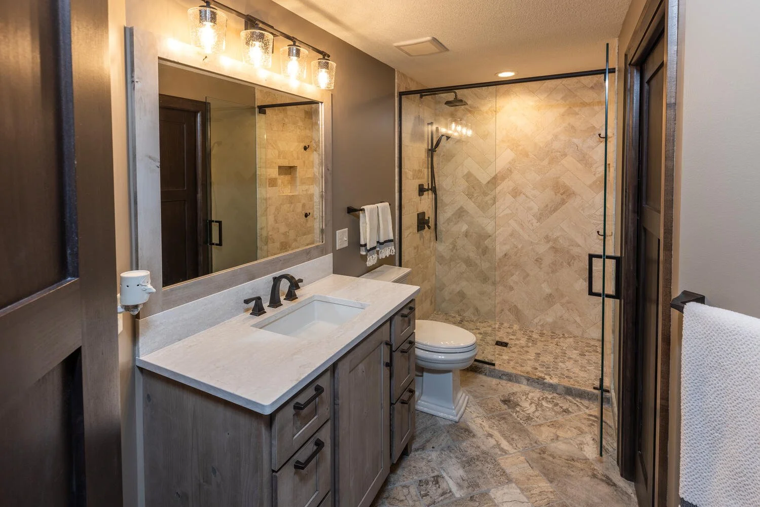 Cozy Lakeville Lower level Bar + Bathroom Remodel — Shaeffer Design Build