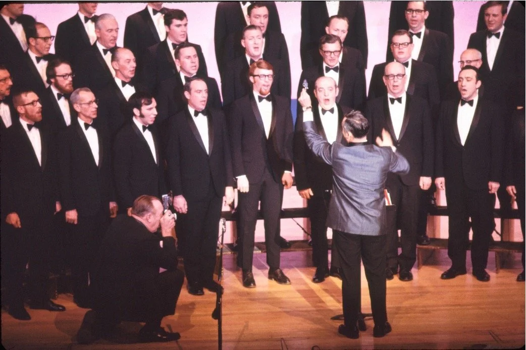 History — Red Blazer Men's Chorus