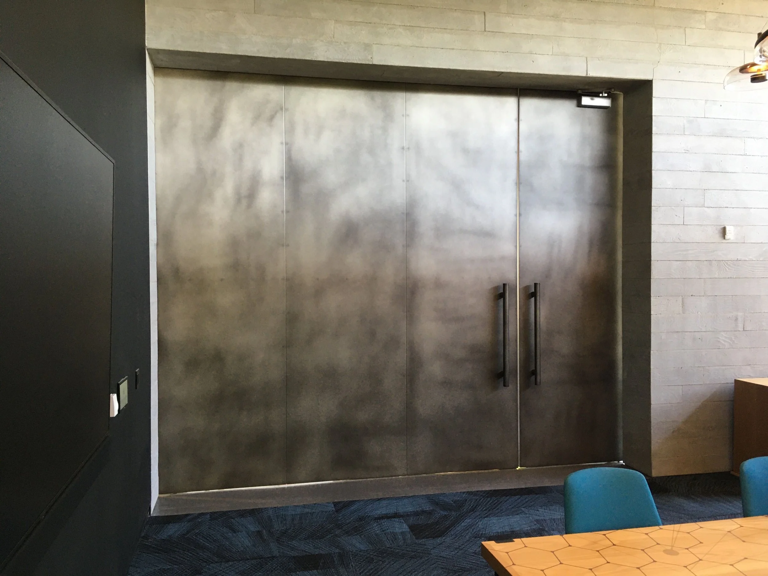 LIFE SCIENCES DEVELOPER Sliding Metal Door & Reception Desk — Muse & Co.