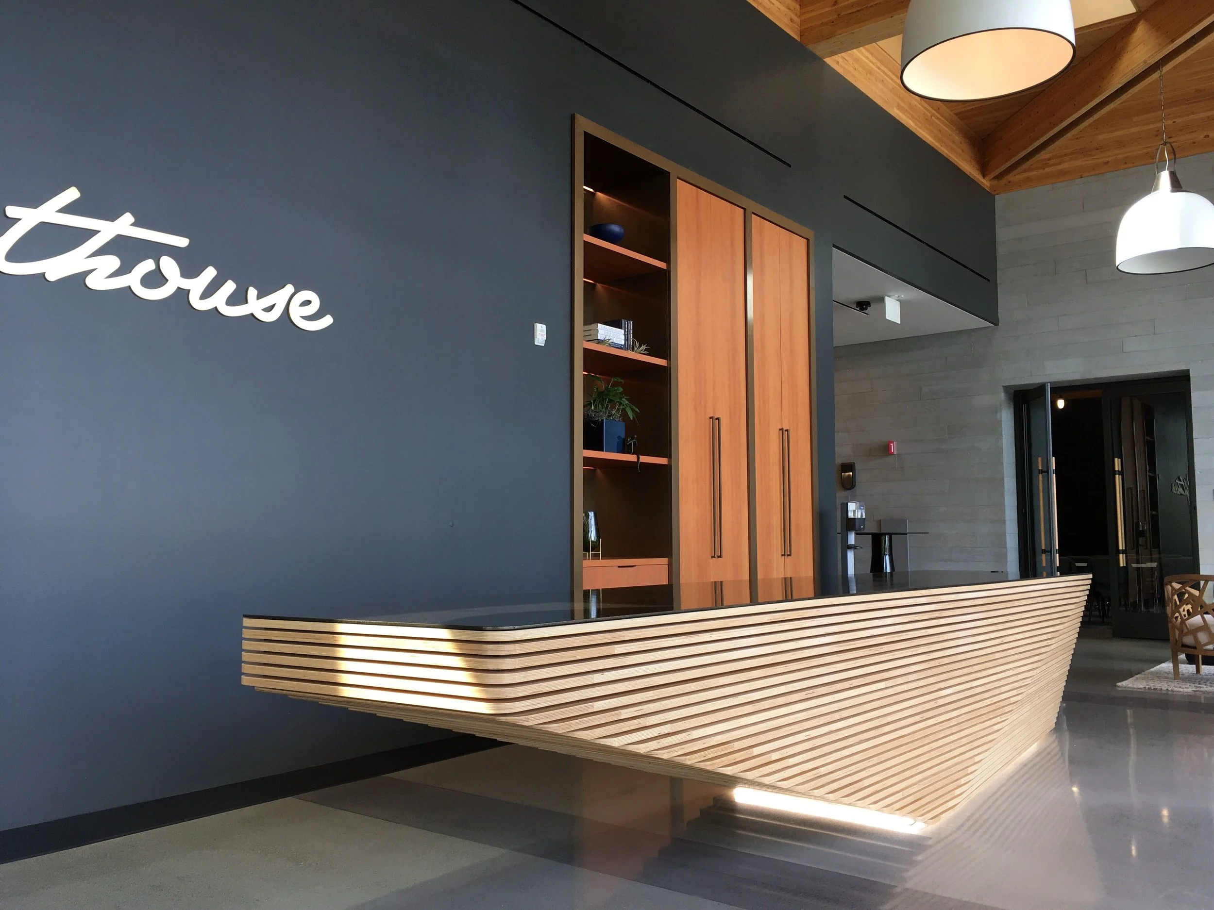 LIFE SCIENCES DEVELOPER Sliding Metal Door & Reception Desk — Muse & Co.