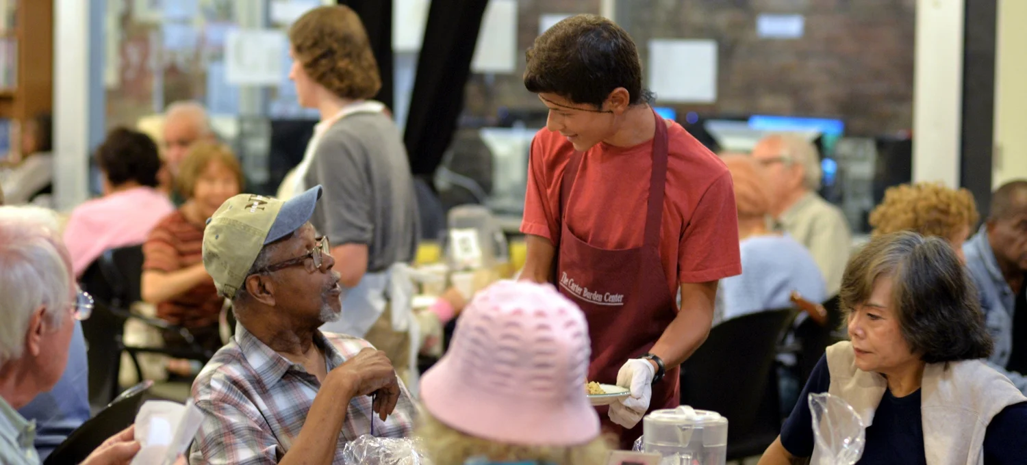 HISTORY — Carter Burden Network