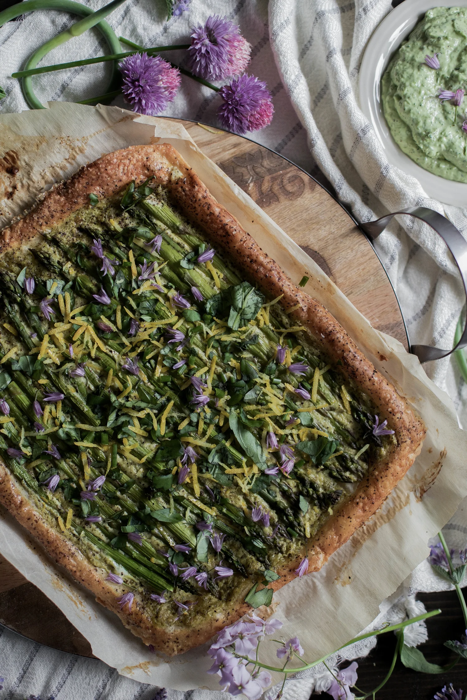 creamy garlic scape + chive flower pesto & asparagus tart — L | E