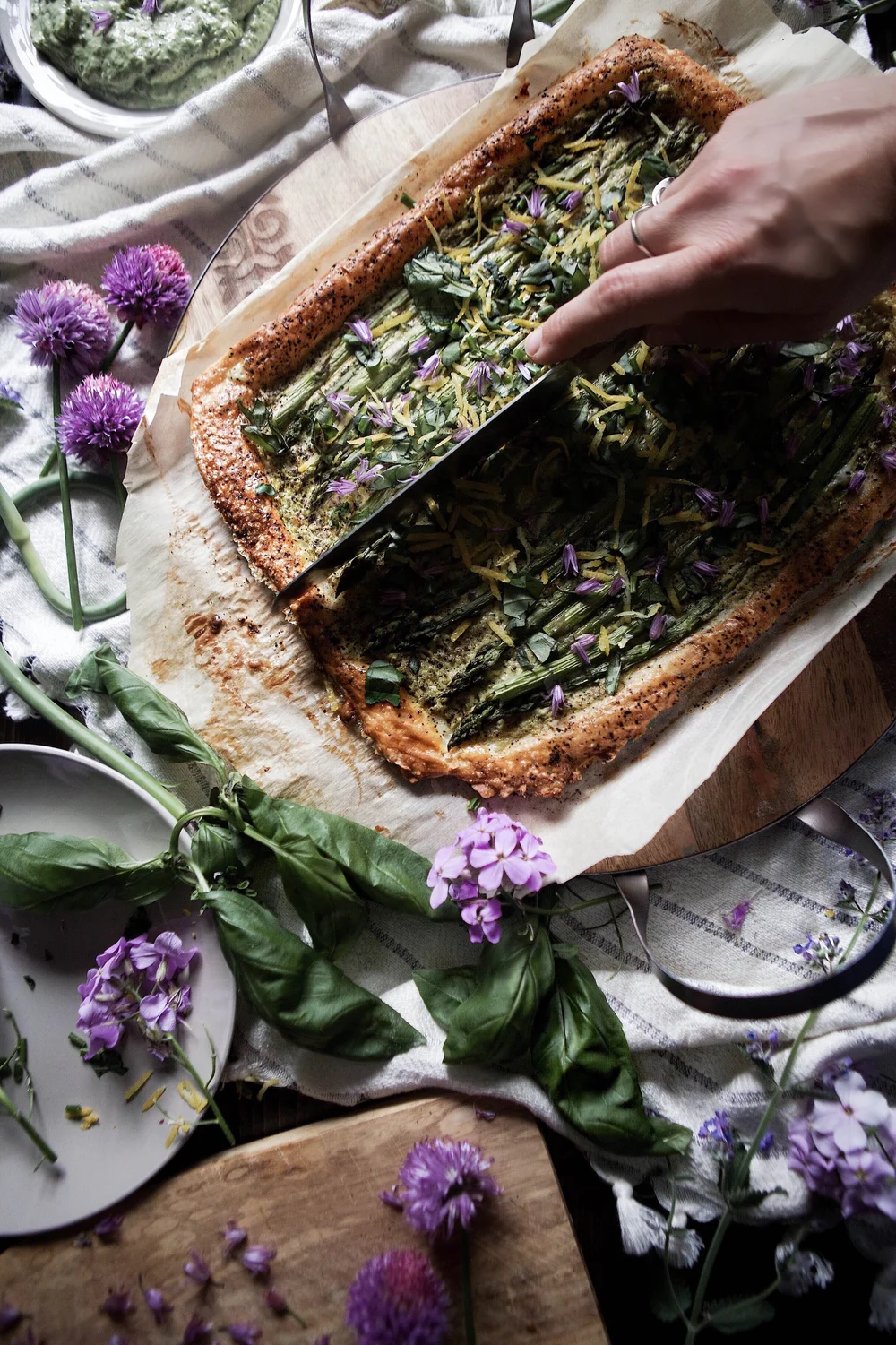 creamy garlic scape + chive flower pesto & asparagus tart — L | E