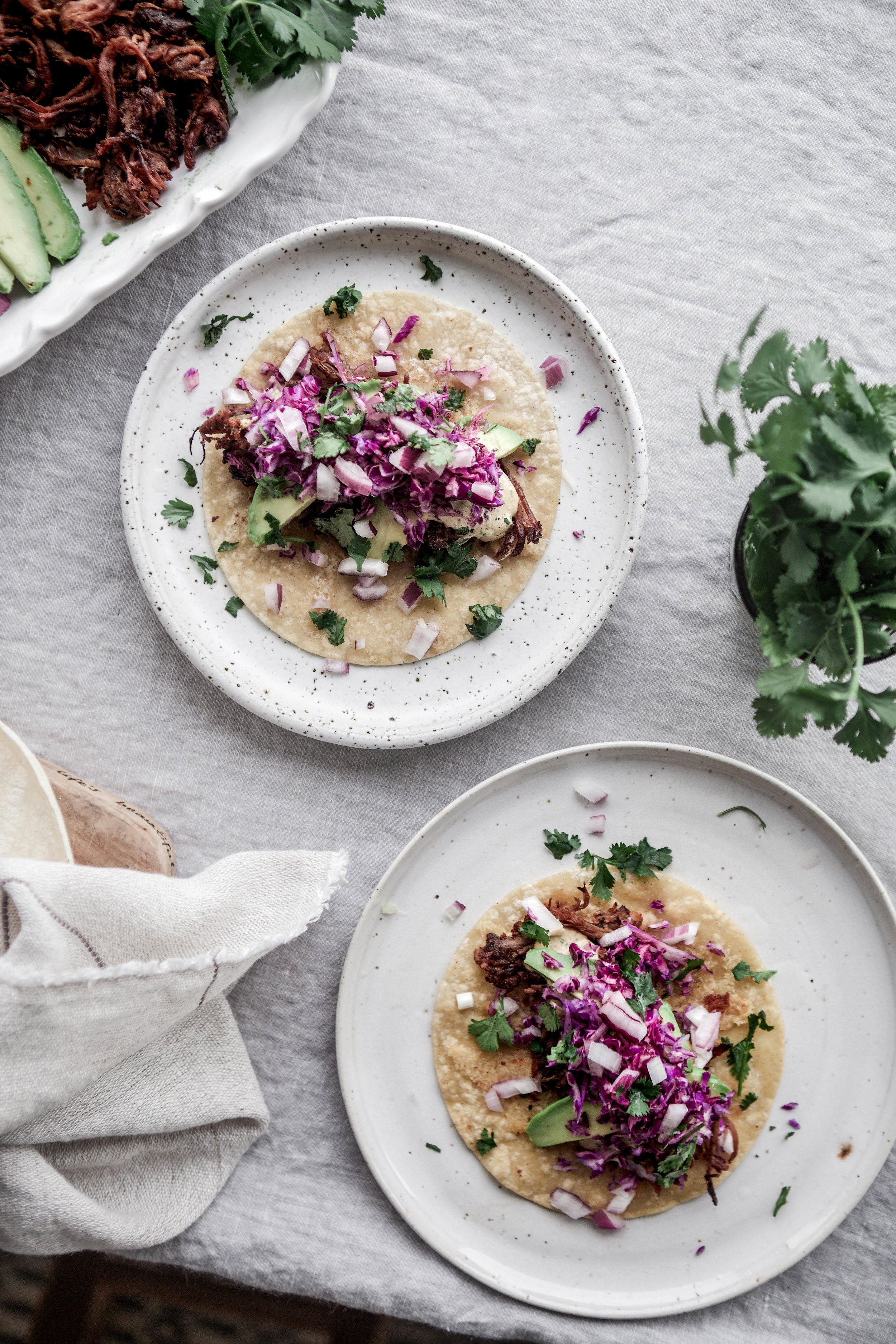 Sweet & spicy, dry rubbed, slow braised, pulled pork tacos — L | E