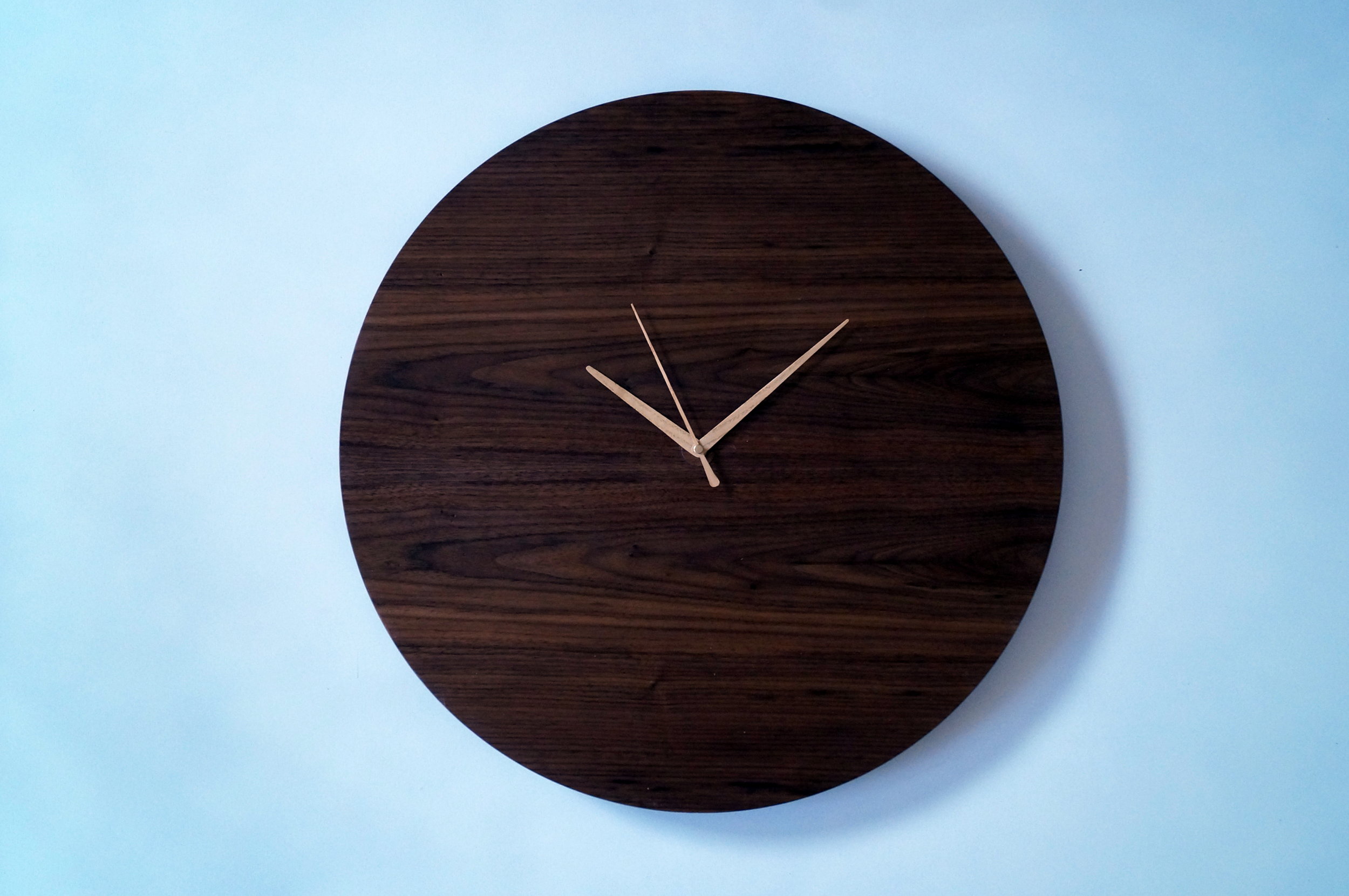 Large round clock in oak or walnut — Liv Cornall Design