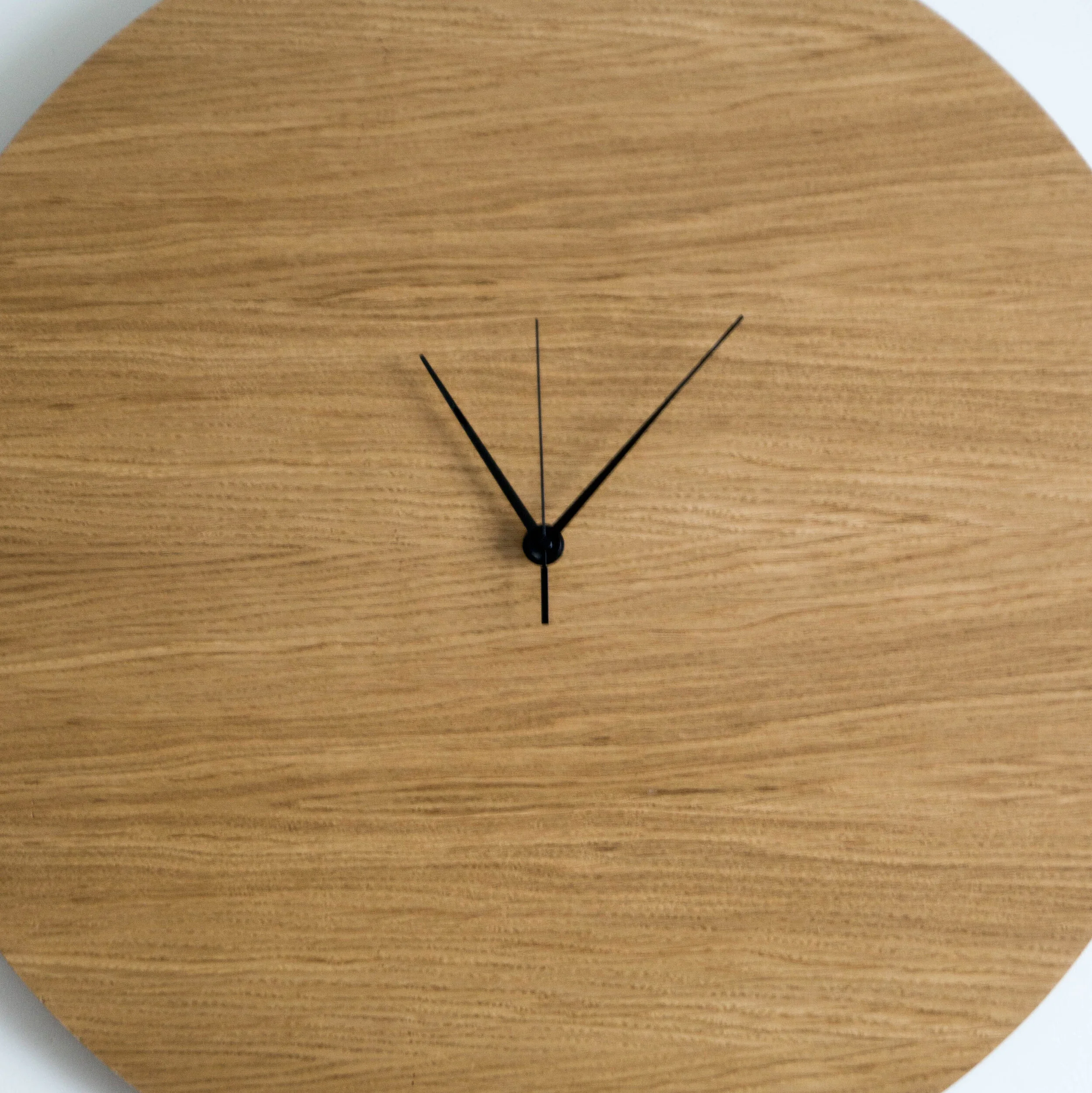Large round clock in oak or walnut — Liv Cornall Design