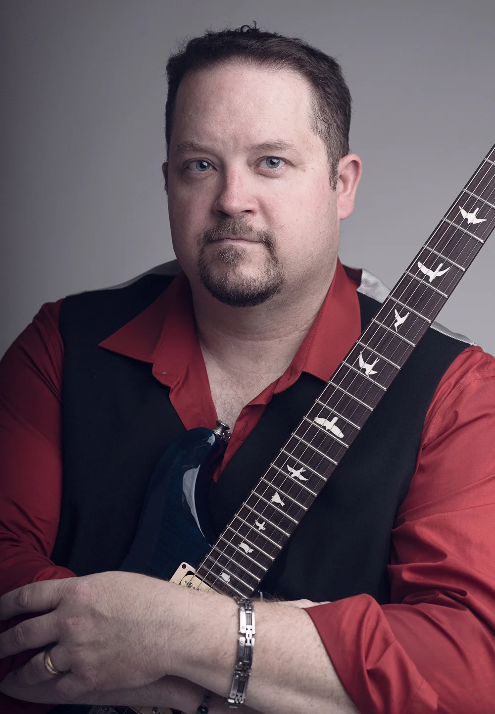 Meet The Band — Vertigo Red