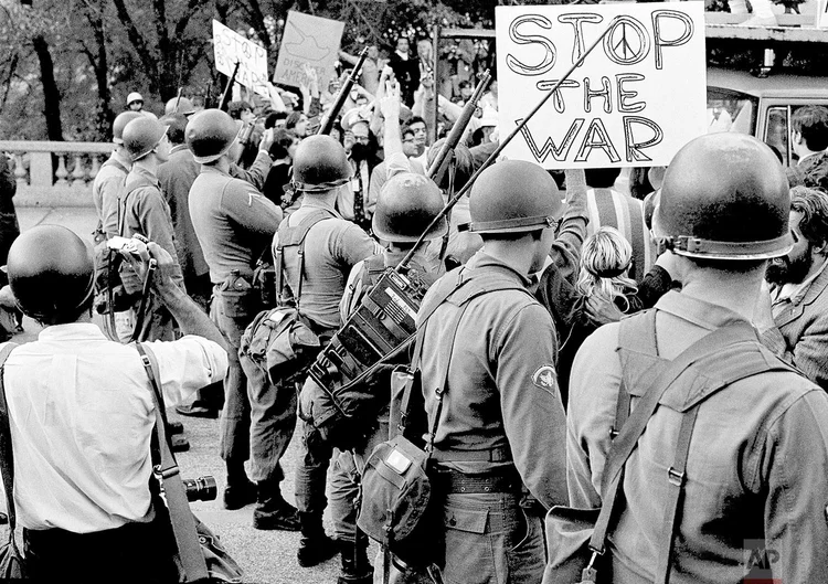 AP Was There: Protesters fight Chicago police, guardsmen — AP Photos