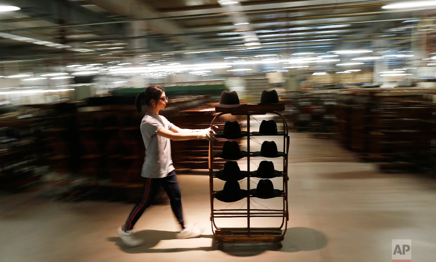 From Bogart to millennials: Italian hat maker tries new look — AP Photos
