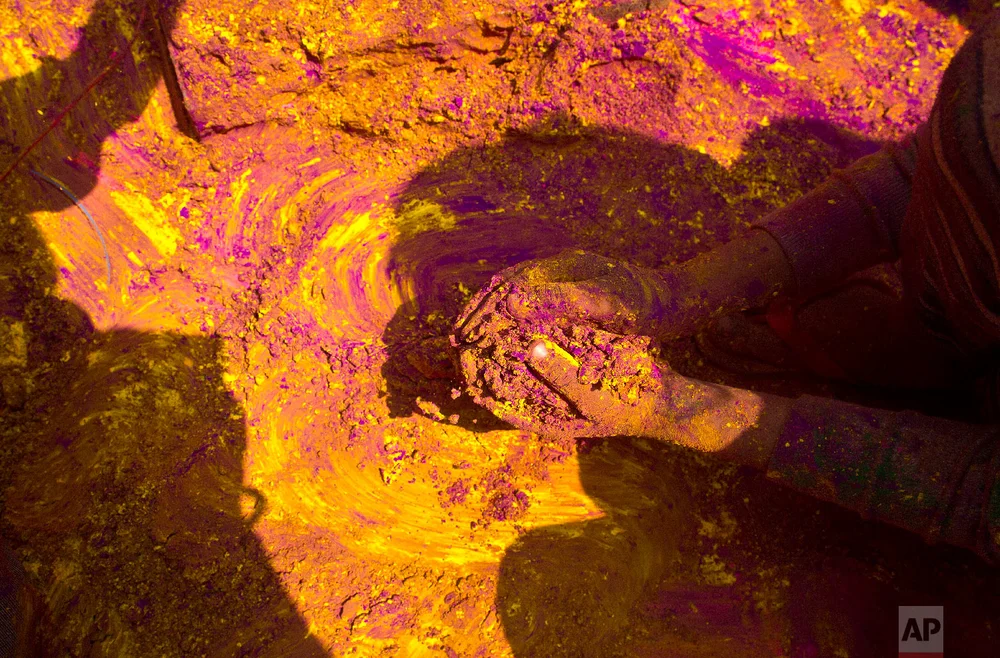 Hindus celebrate Holi, the festival of colors across India — AP Photos