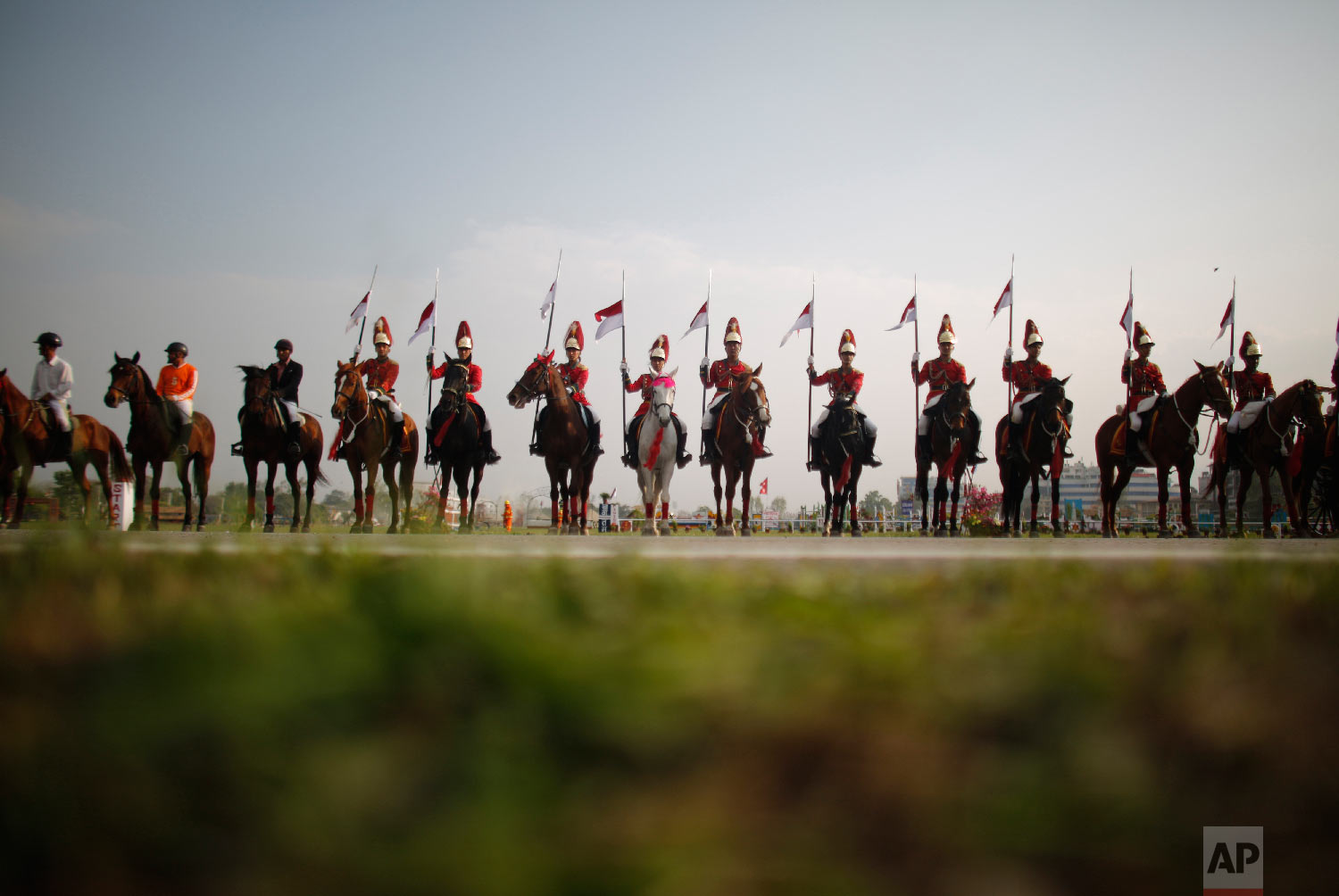 Horses race in Nepal capital to keep devils away — AP Photos