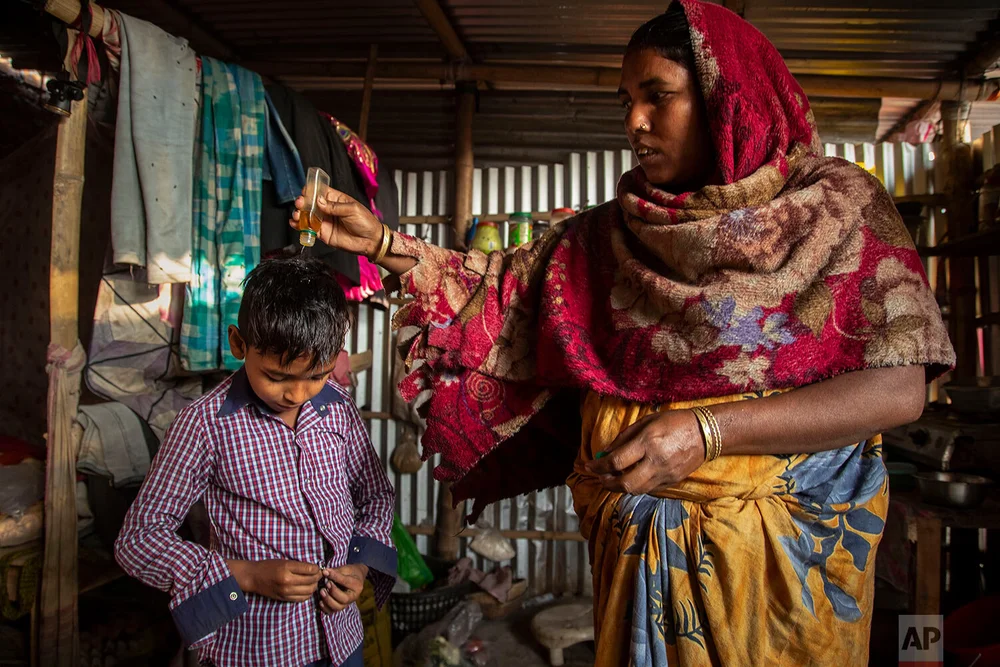 A day in the life of an Indian child scavenger — AP Photos