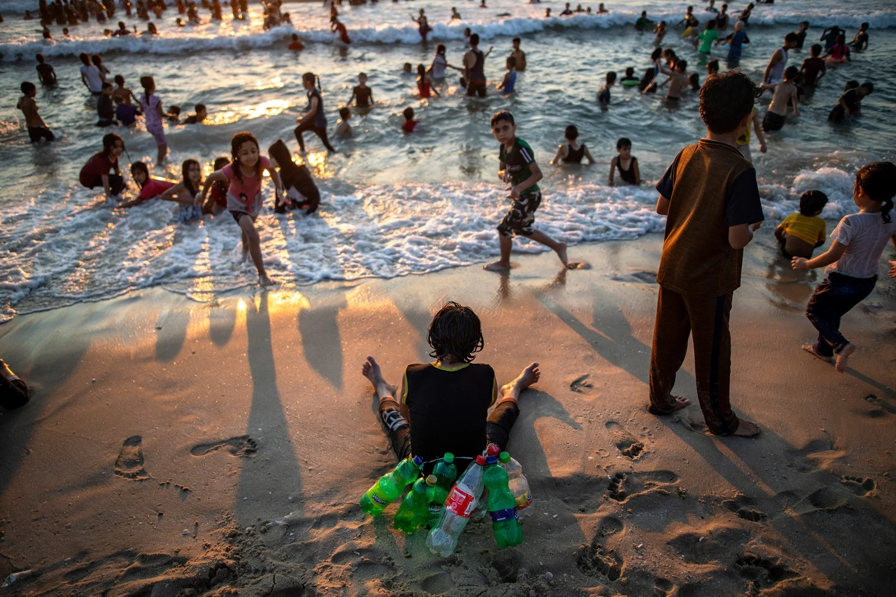 Summer days at the beach, in Israel and Gaza — AP Photos