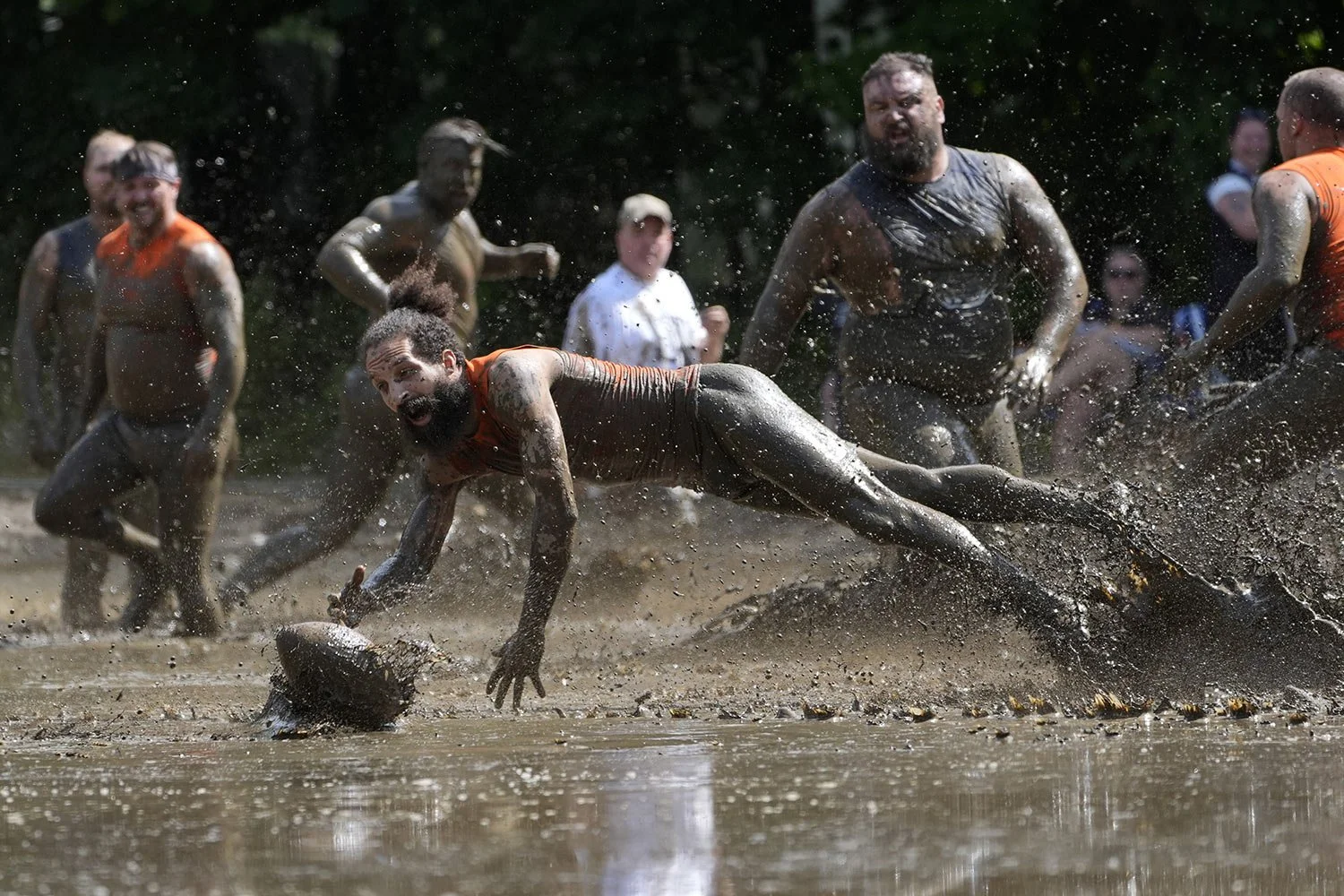 Joy in Mud Bowl: Football tournament celebrates 50 years of messy fun ...
