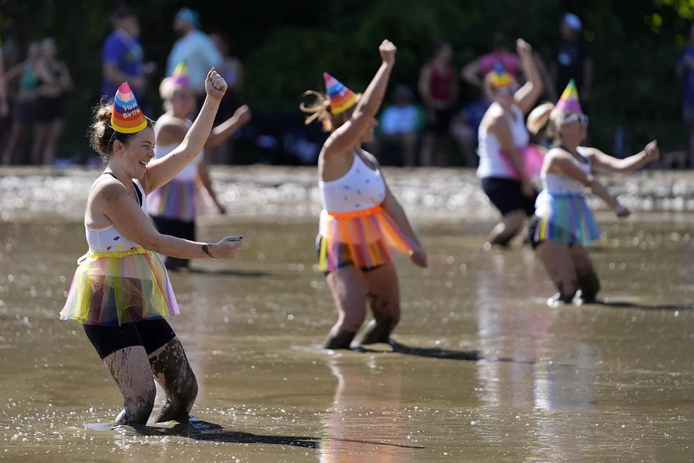 Joy in Mud Bowl: Football tournament celebrates 50 years of messy fun ...