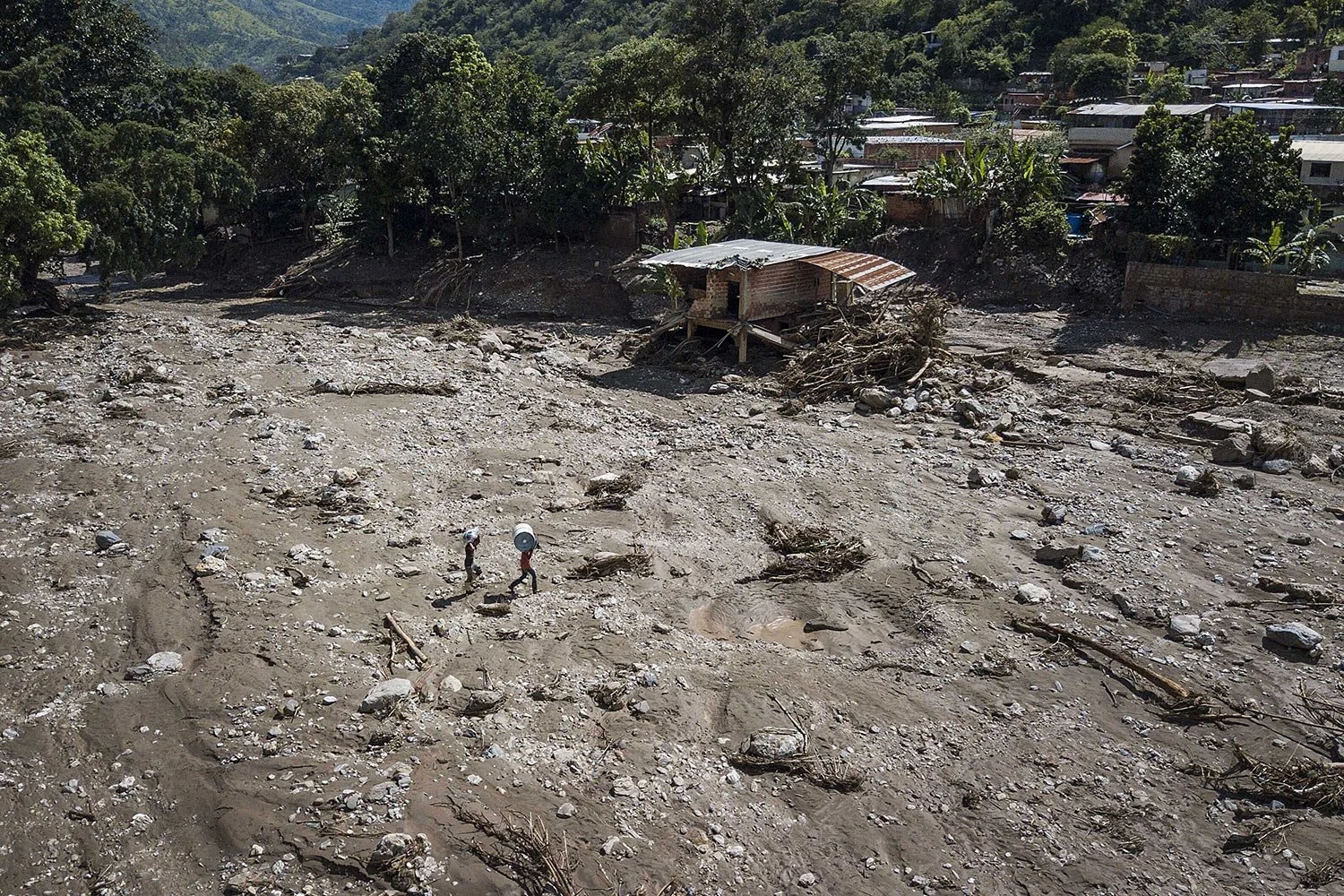Tales of survival emerge from Venezuela's landslide — AP Photos