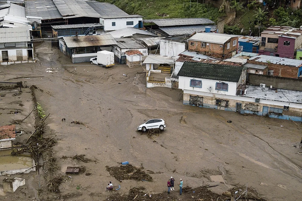 Tales of survival emerge from Venezuela's landslide — AP Photos