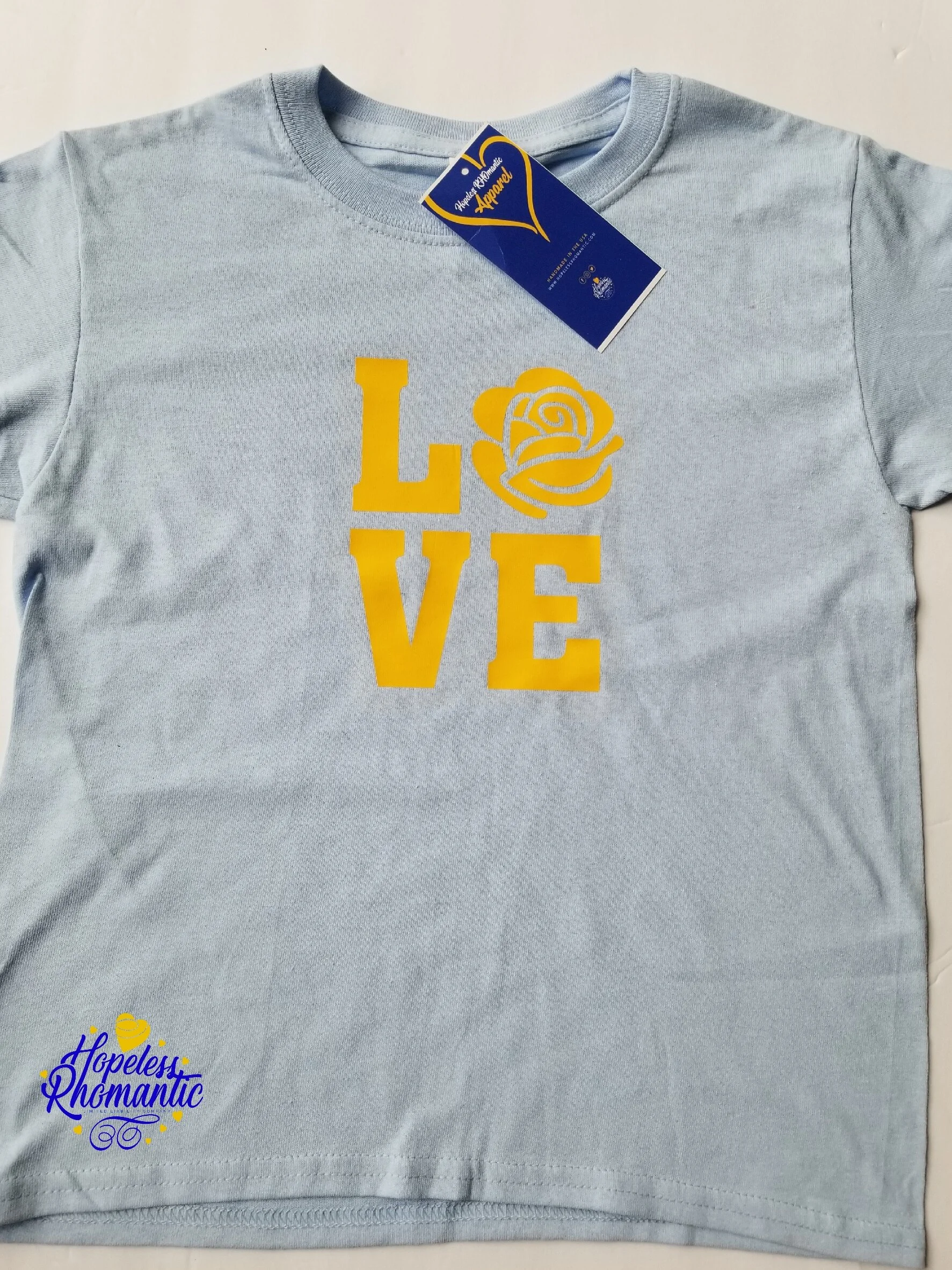 All Rhoer & Rhosebud — Hopeless RHOmantic, LLC