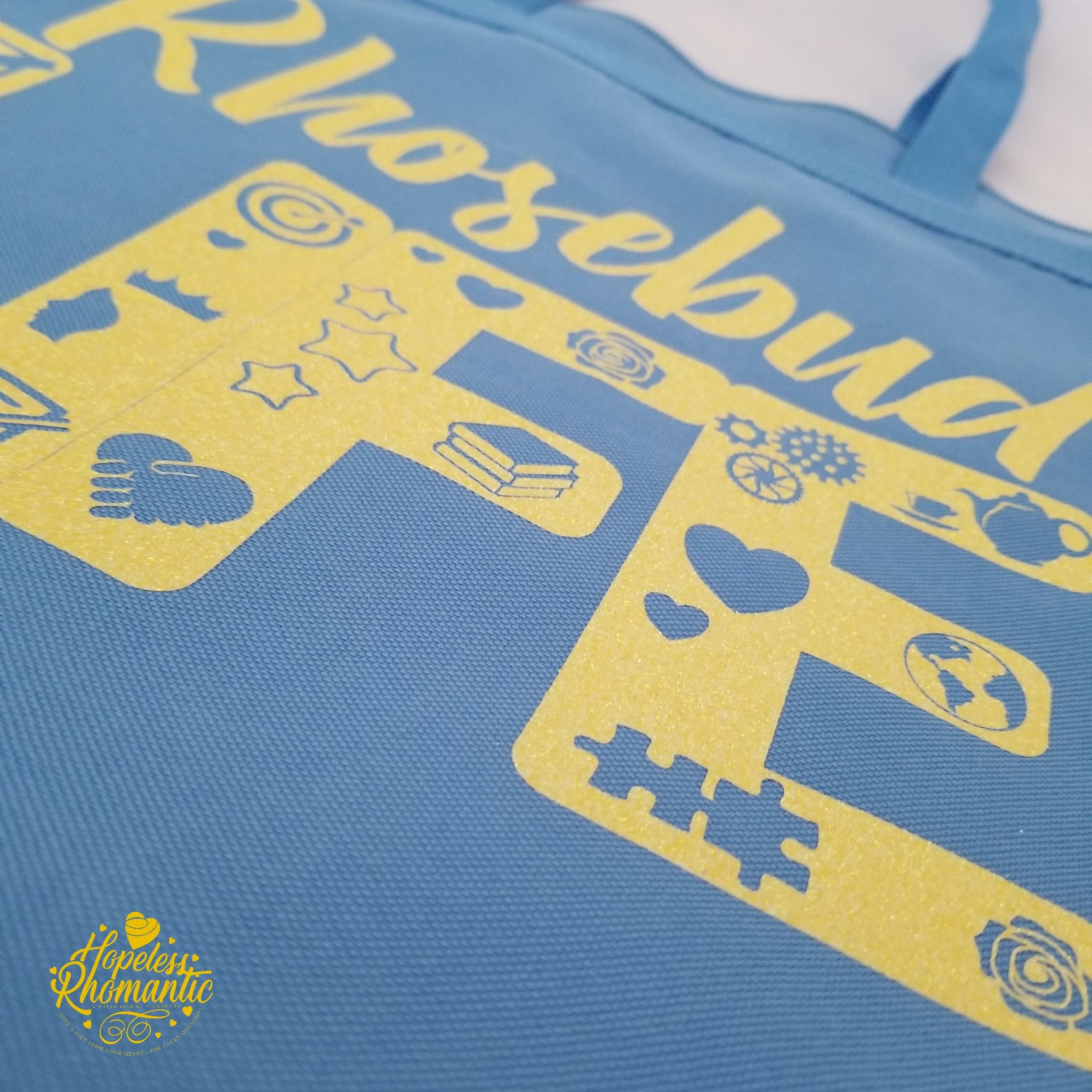 All Rhoer & Rhosebud — Hopeless RHOmantic, LLC