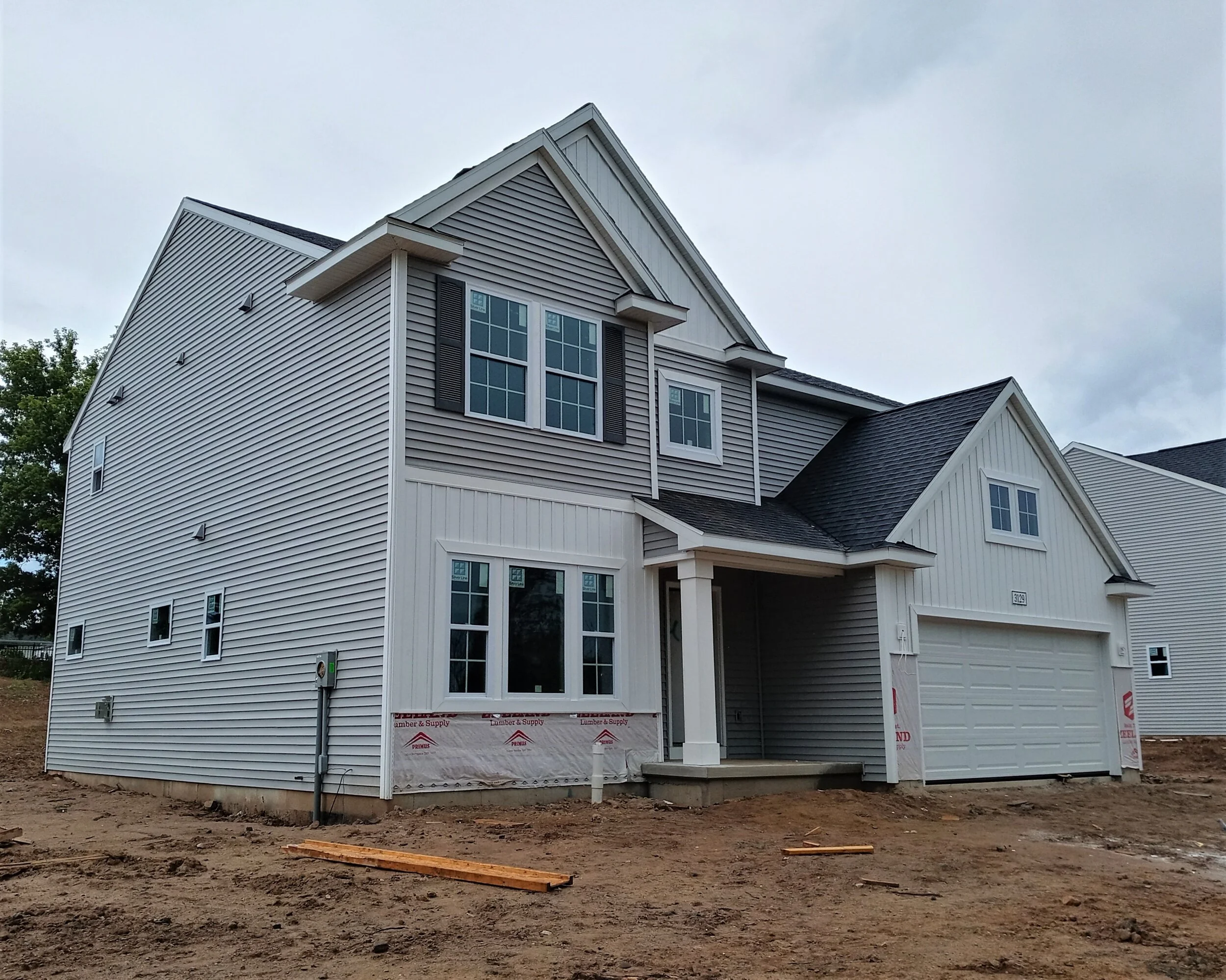 Roofing and Siding in Lansing, MI — American Classic Roofing & Building ...