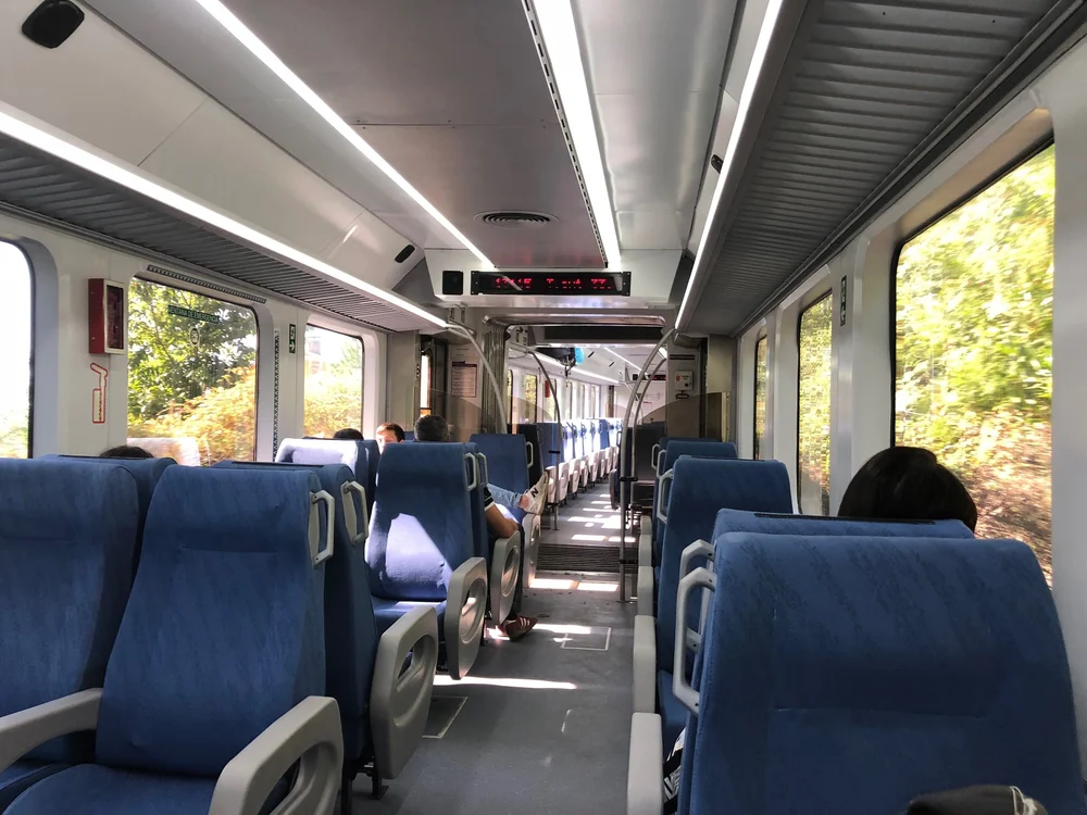 Traveling on Renfe's FEVE (now "Cercanías AM") Narrow-gauge Rail ...