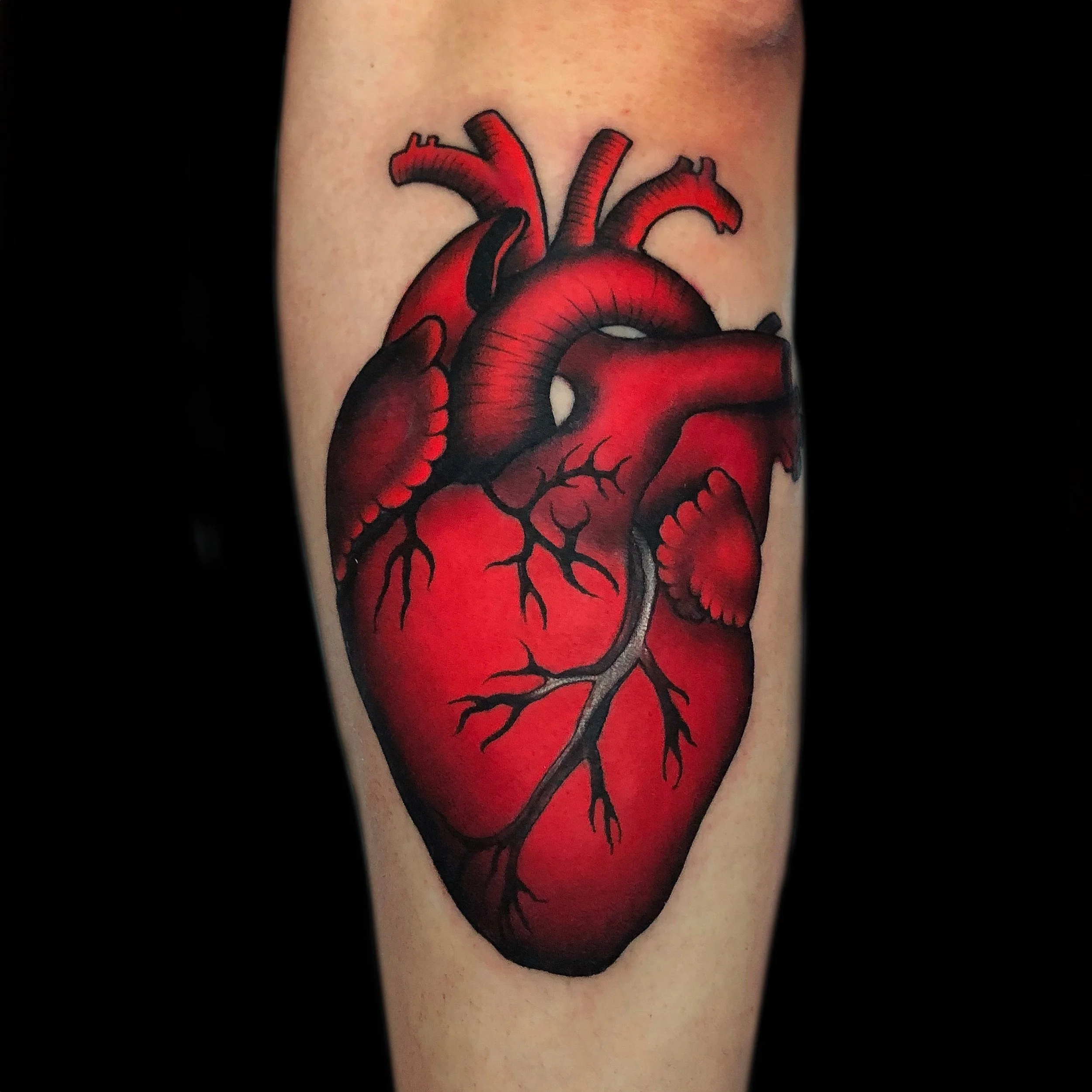 Traditional Human Heart Tattoos