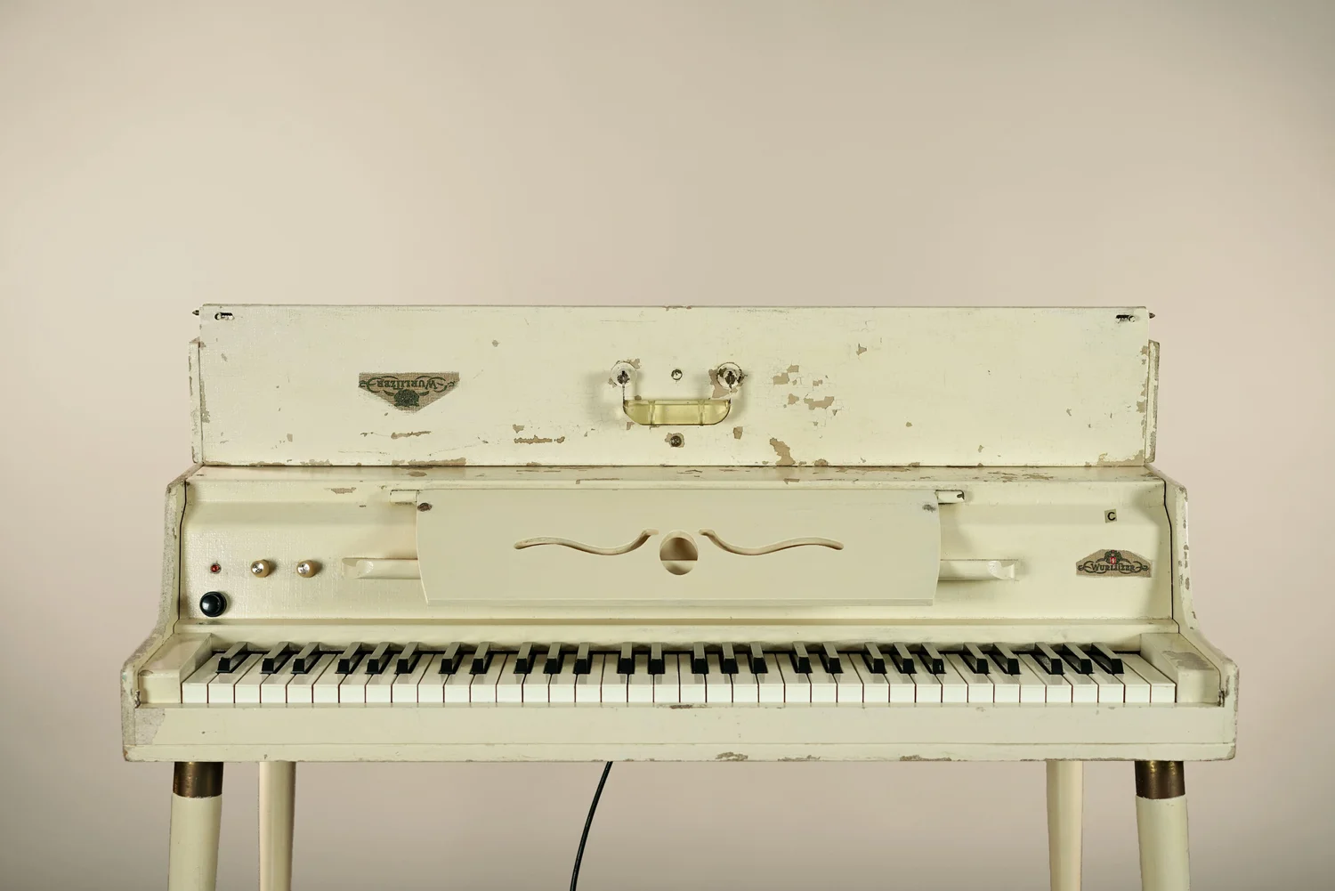 Why We Love Wurlitzers with Built-In Leg Storage — Tropical Fish