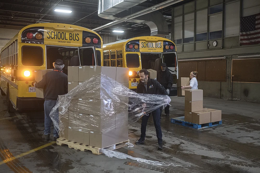 School buses begin delivering the tools for distance learning — North News