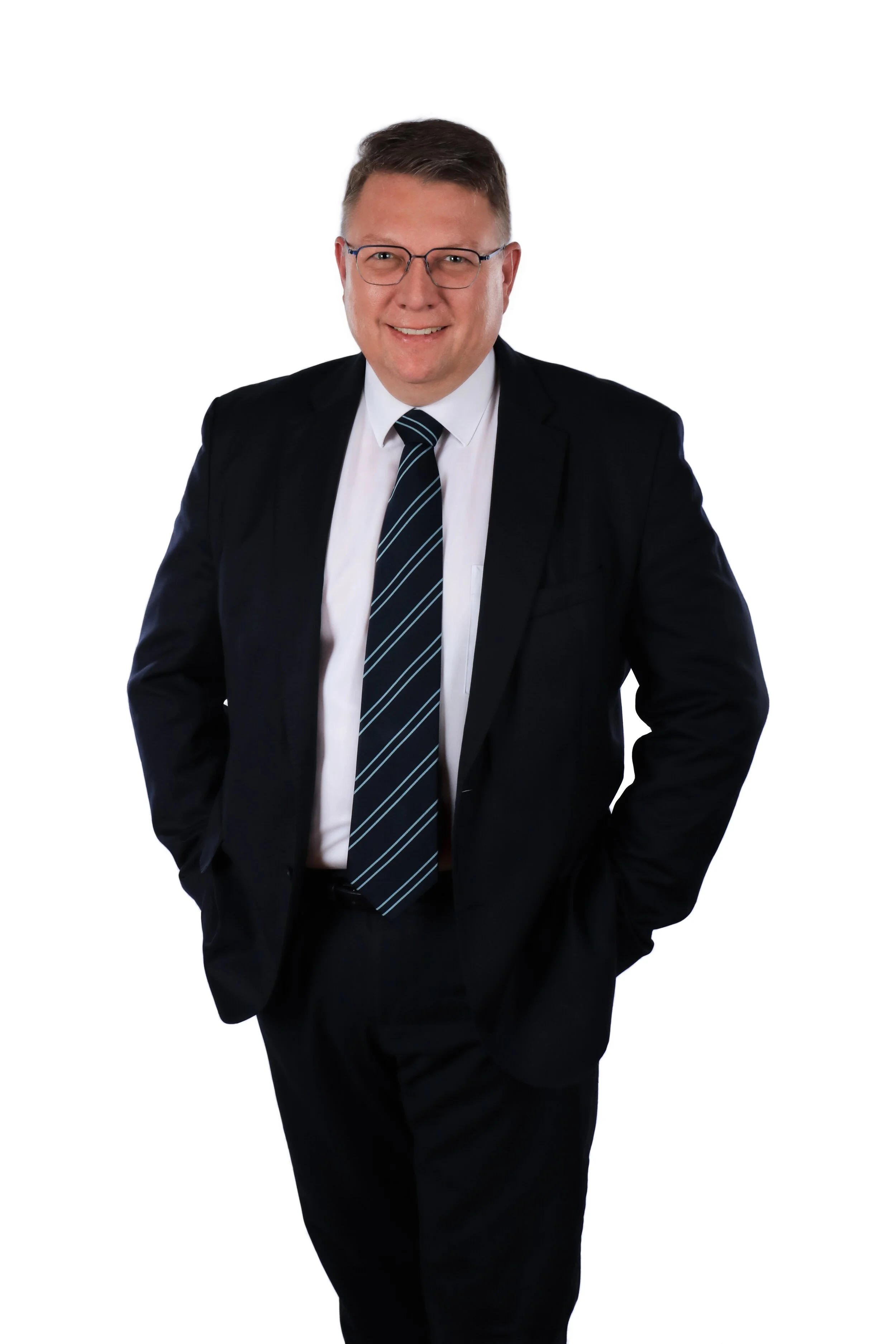 Profile — Dr. Nigel Wilson