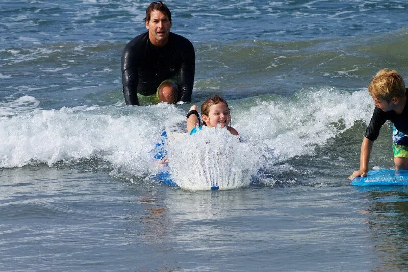 With closed churches, open beaches, California surfer ministry hits the ...