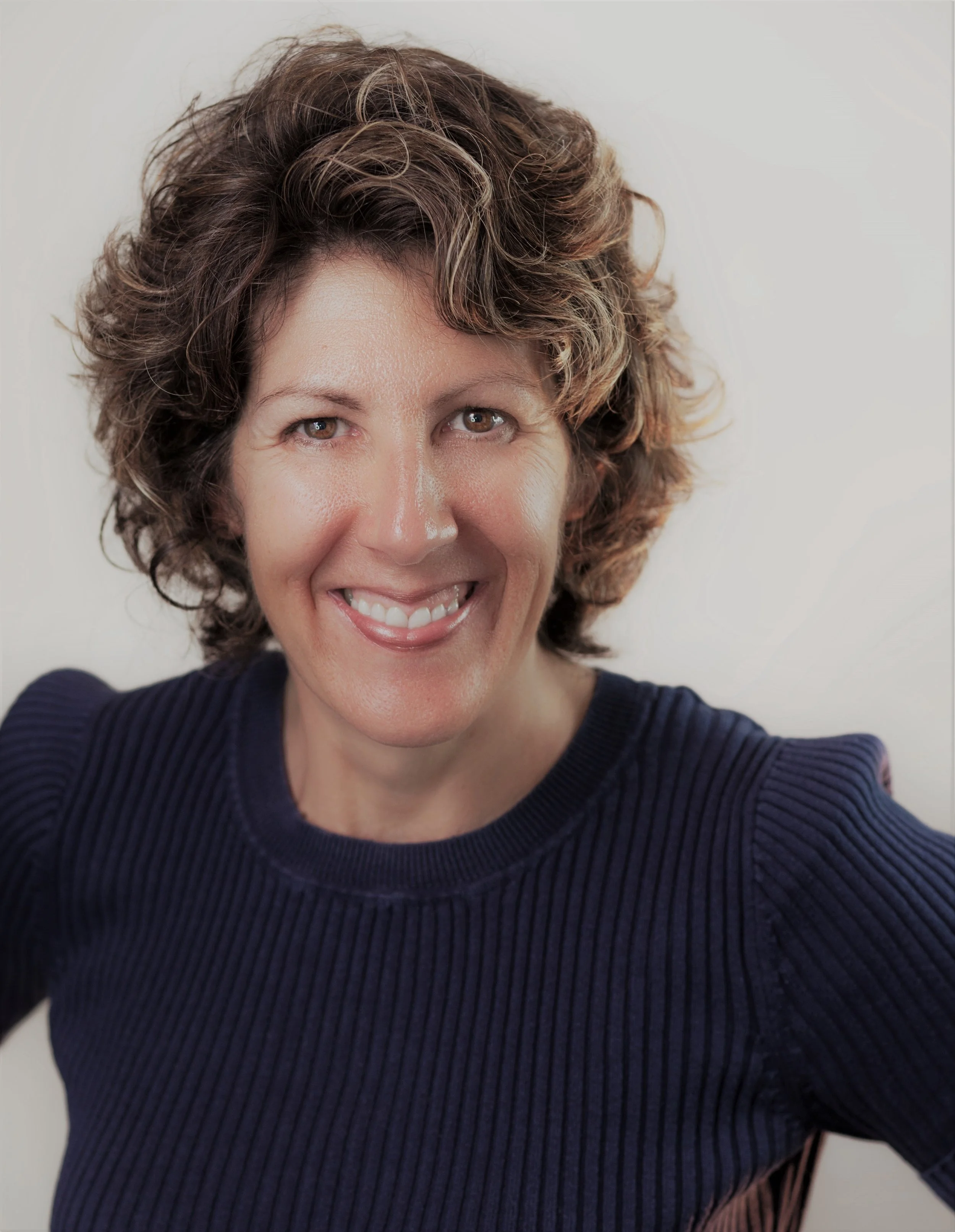Amy Irvine's Bio — Rooted Planning Group