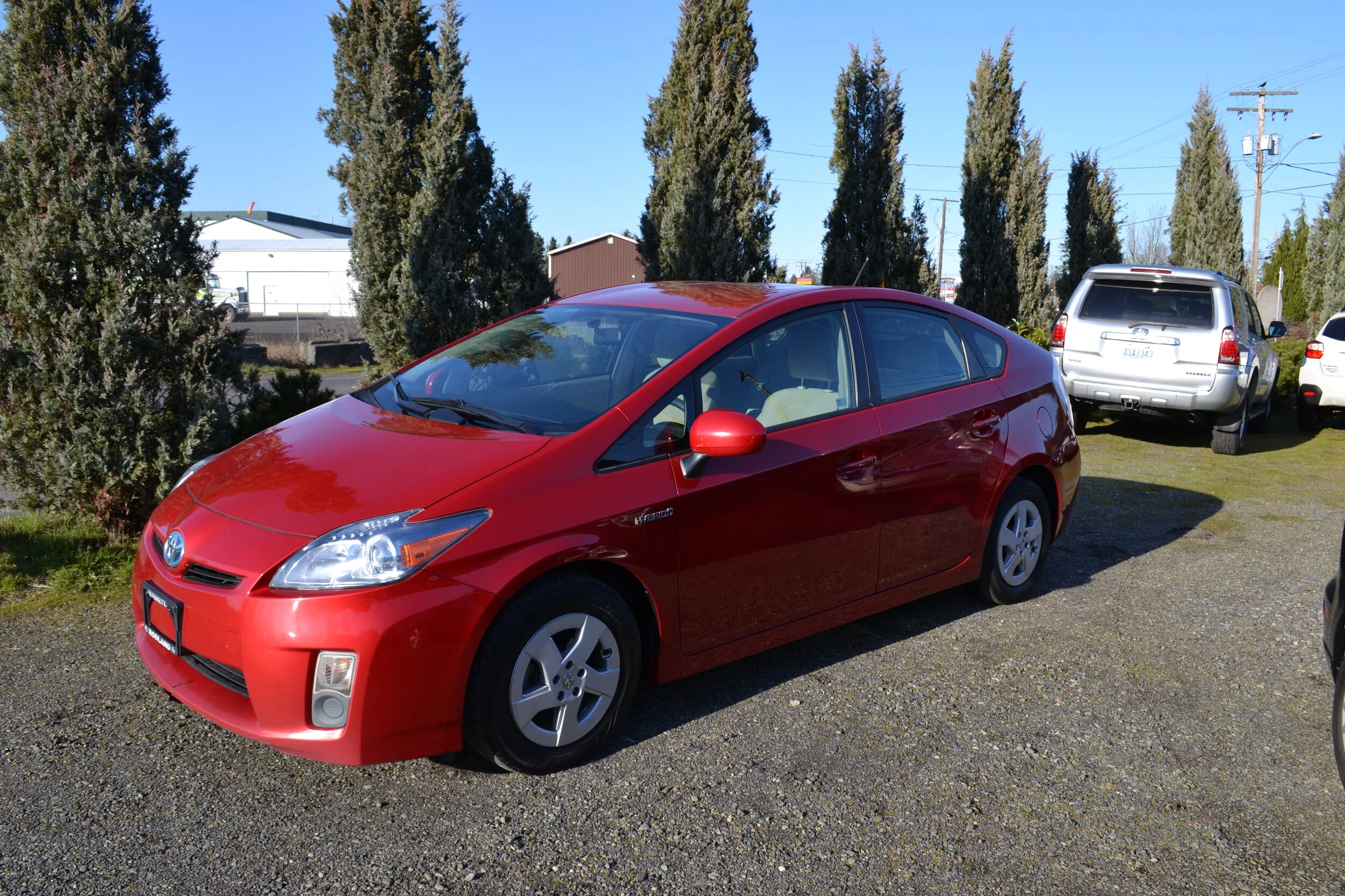 2011 Chevy Red Metallic Prius