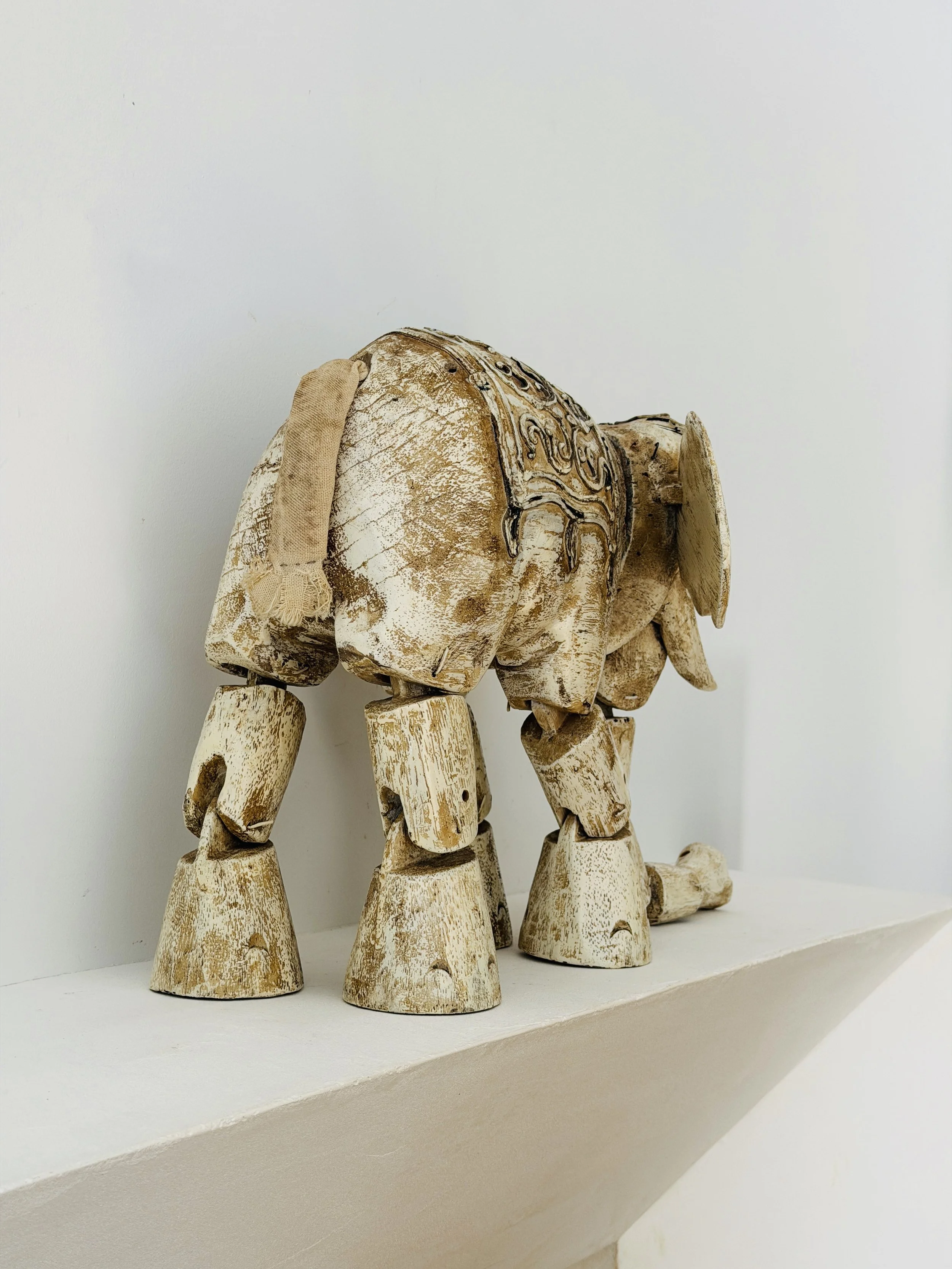 MATERI(A)NTIQUES LARGE IVORY CARVED WOOD MOBILE JOINT ELEPHANT FIGURINE