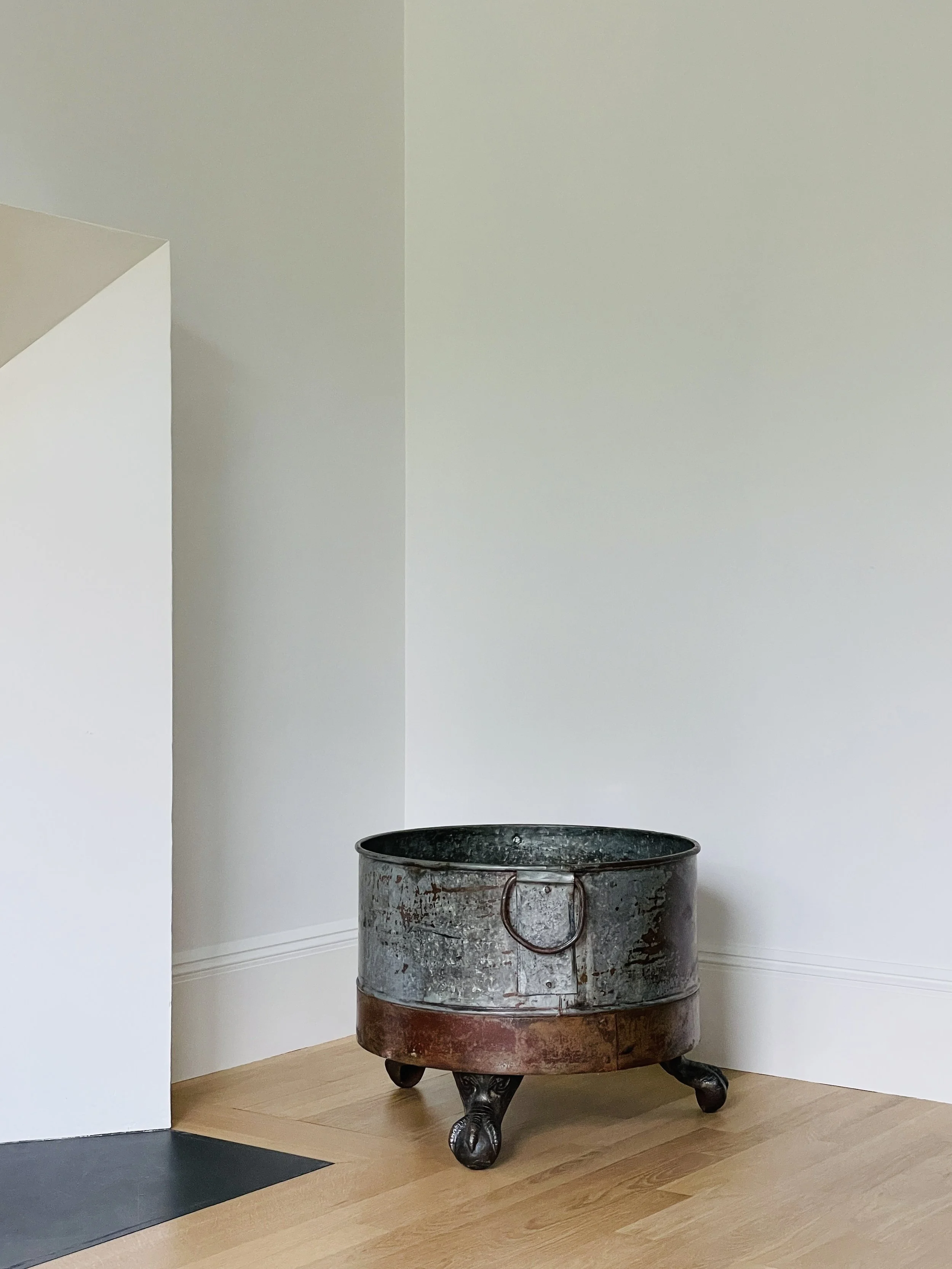 MATERI(A)NTIQUES LARGE METAL ROUND FOOTED PLANT HOLDER