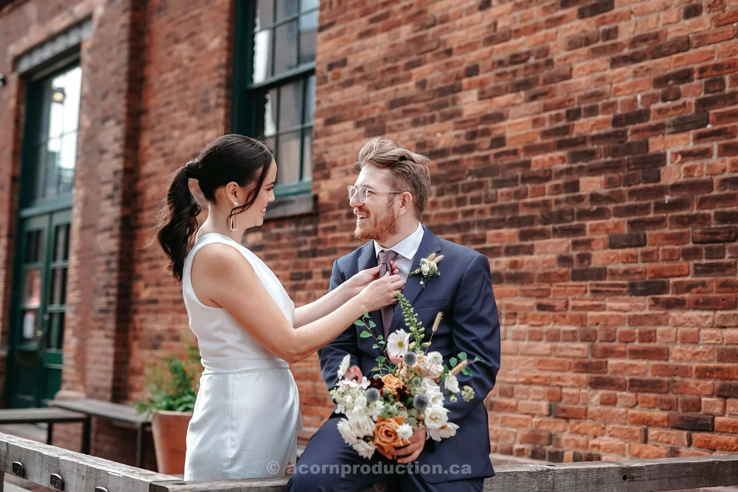 A casual outdoor wedding at the distillery district in Toronto ...