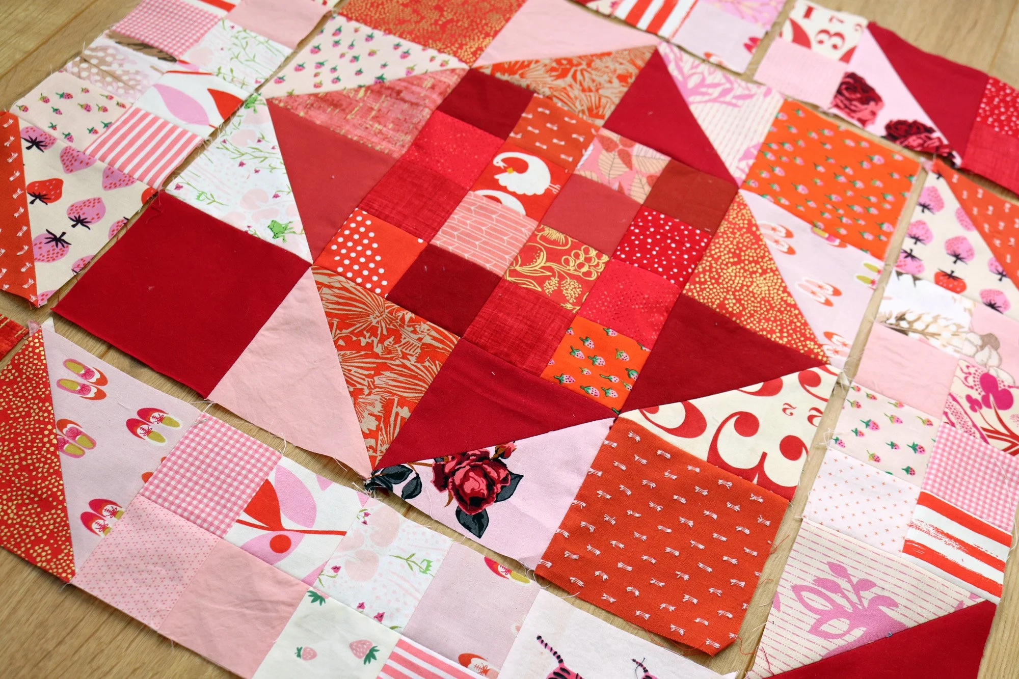 Postage Stamps, a scrappy star ensemble — Stitched in Color