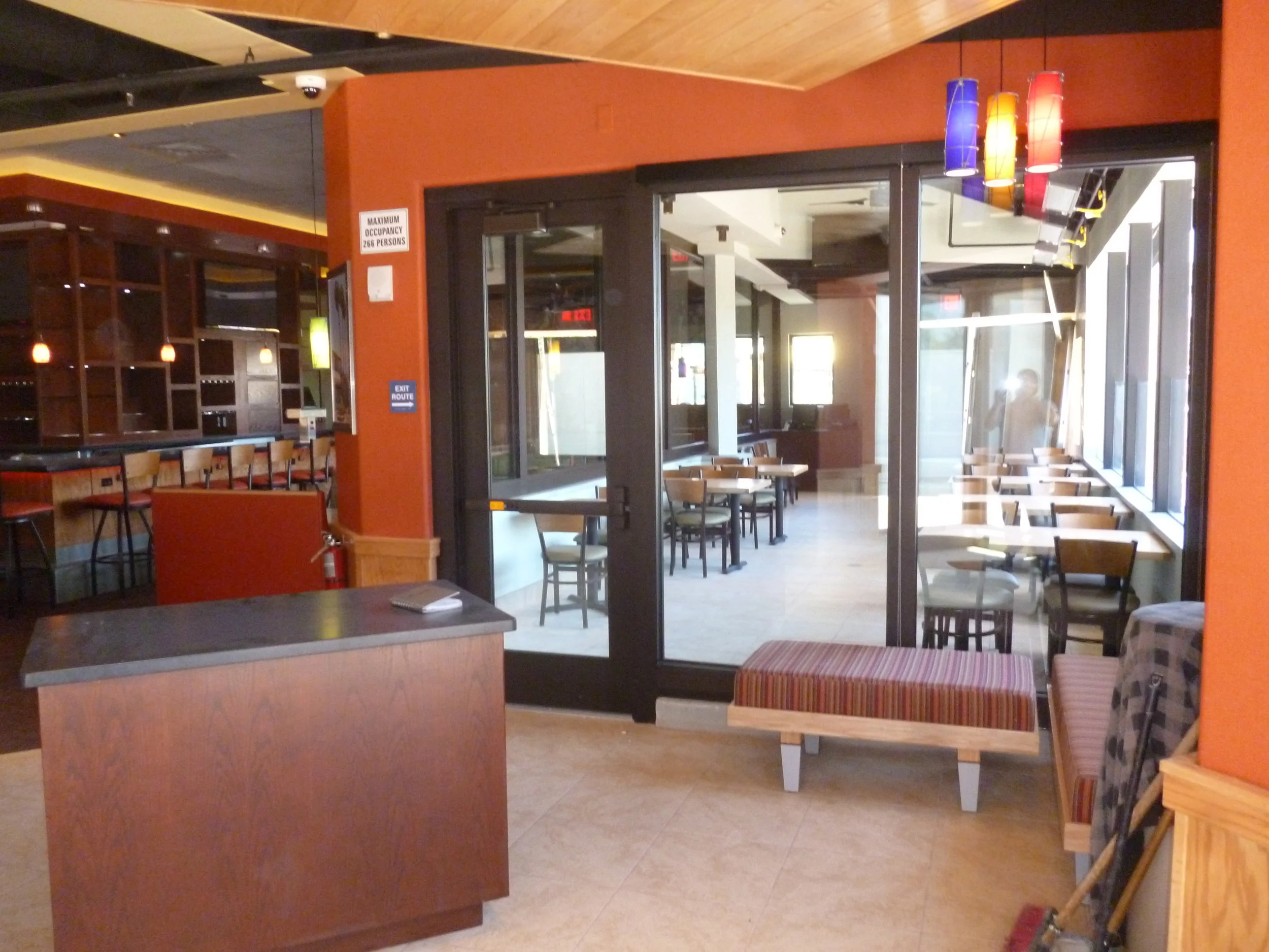 Storefronts — Orange Mirror and Glass