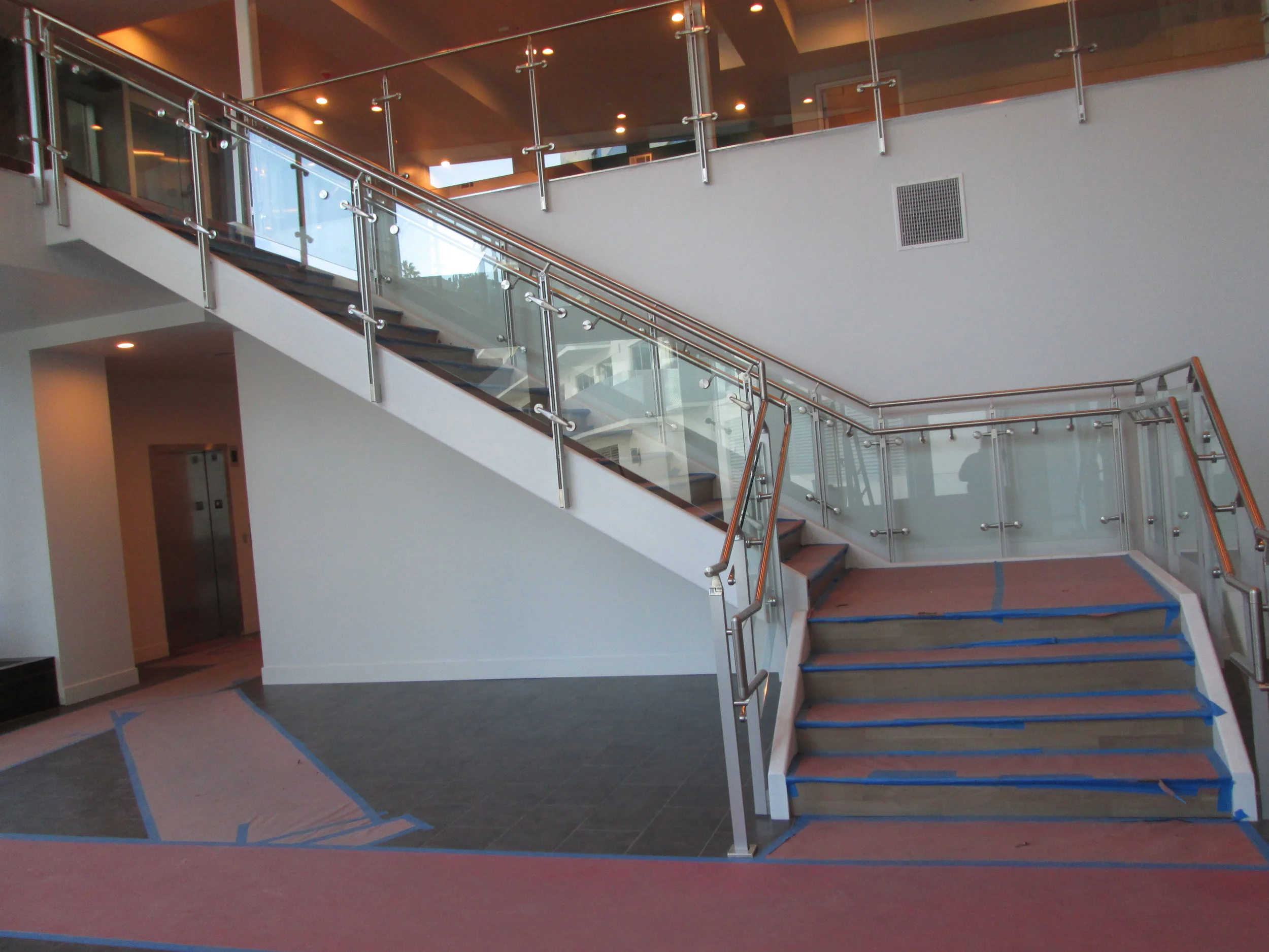 Glass Railing Systems — Orange Mirror and Glass