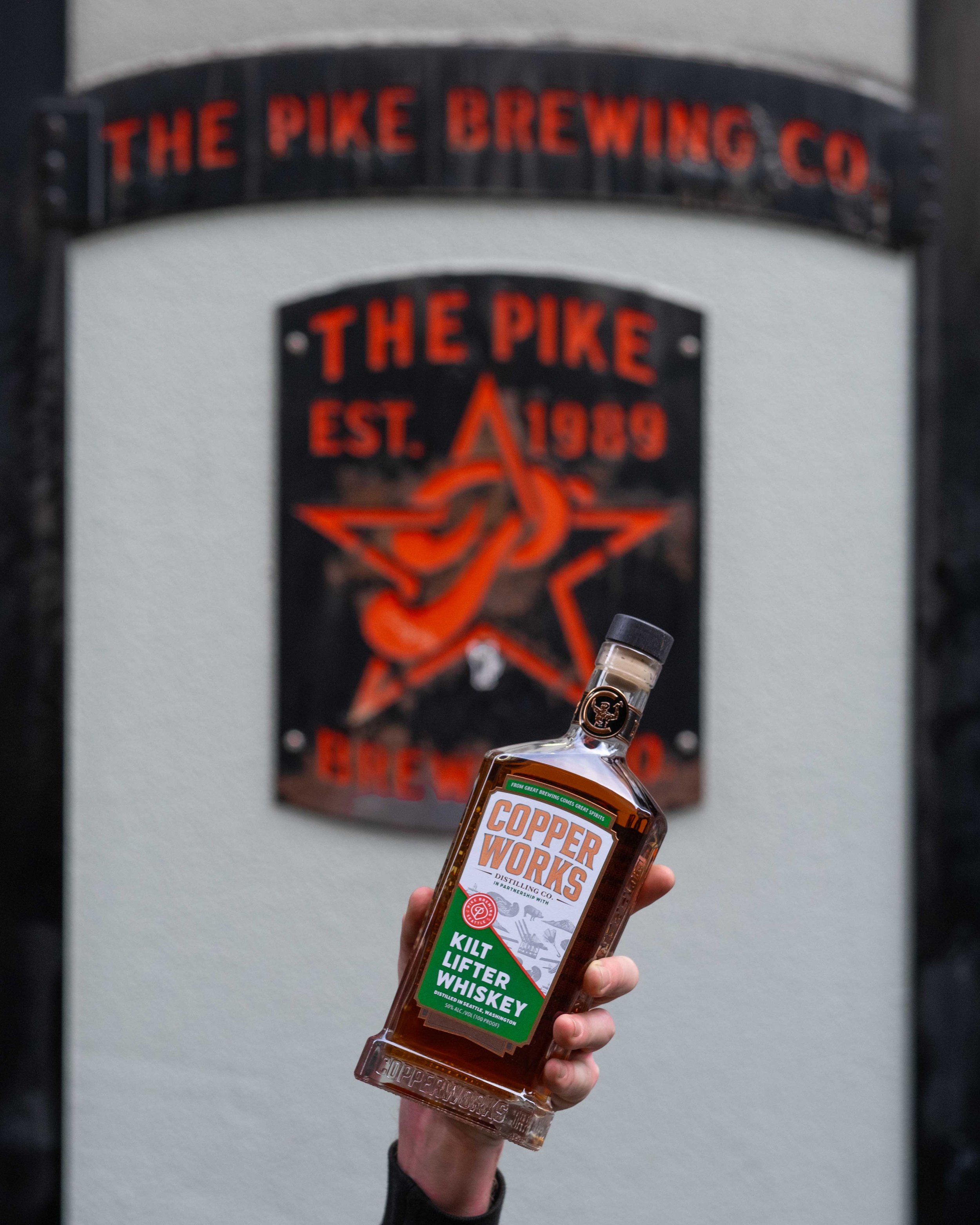Copperworks Distilling and Pike Brewing invite you to pick up a bottle ...