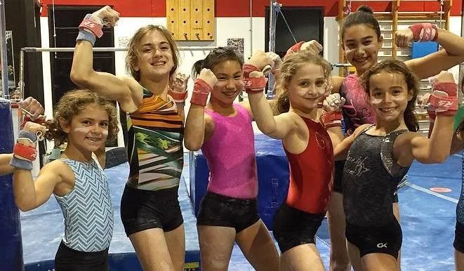 Gymnastics Classes: Ages 6-13 — Gymtowne Gymnastics Coastside