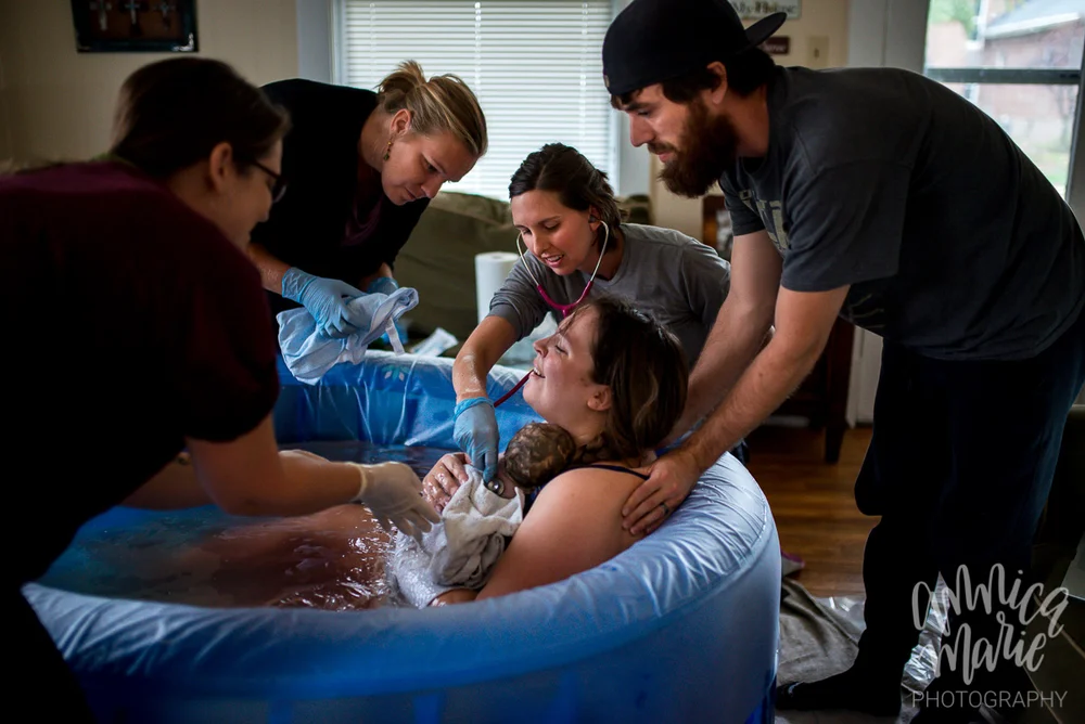 Women Giving Birth At Home In Water