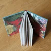 a small trio with print endpapers — paperiaarre