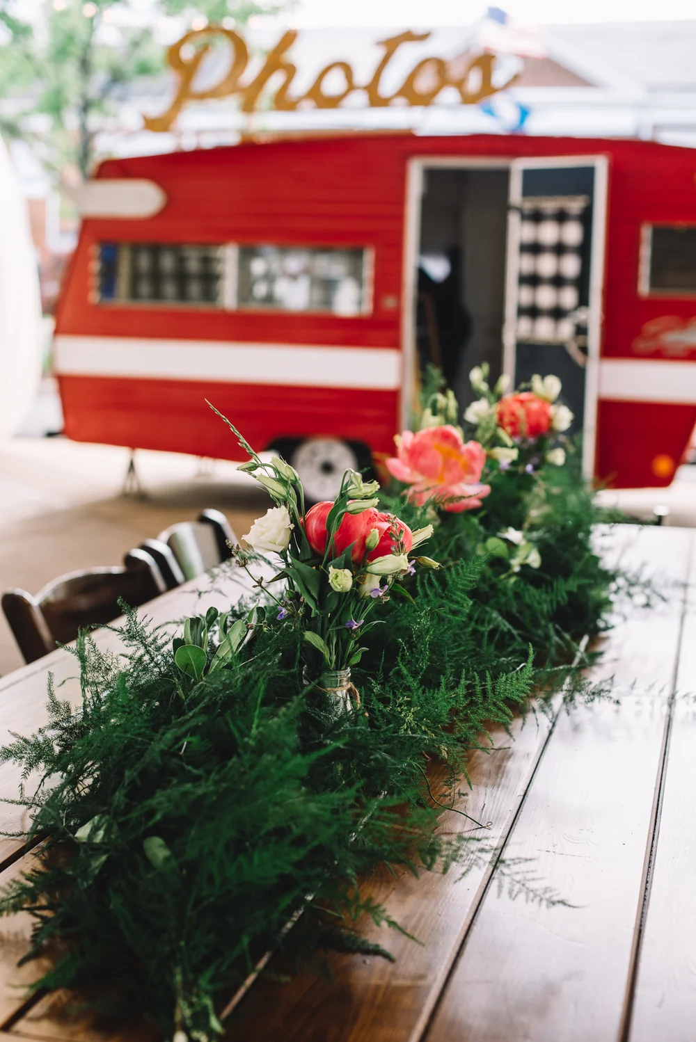 The Rosy Red Vintage Travel Trailer Booth — The Rosy Co. Photo Experiences