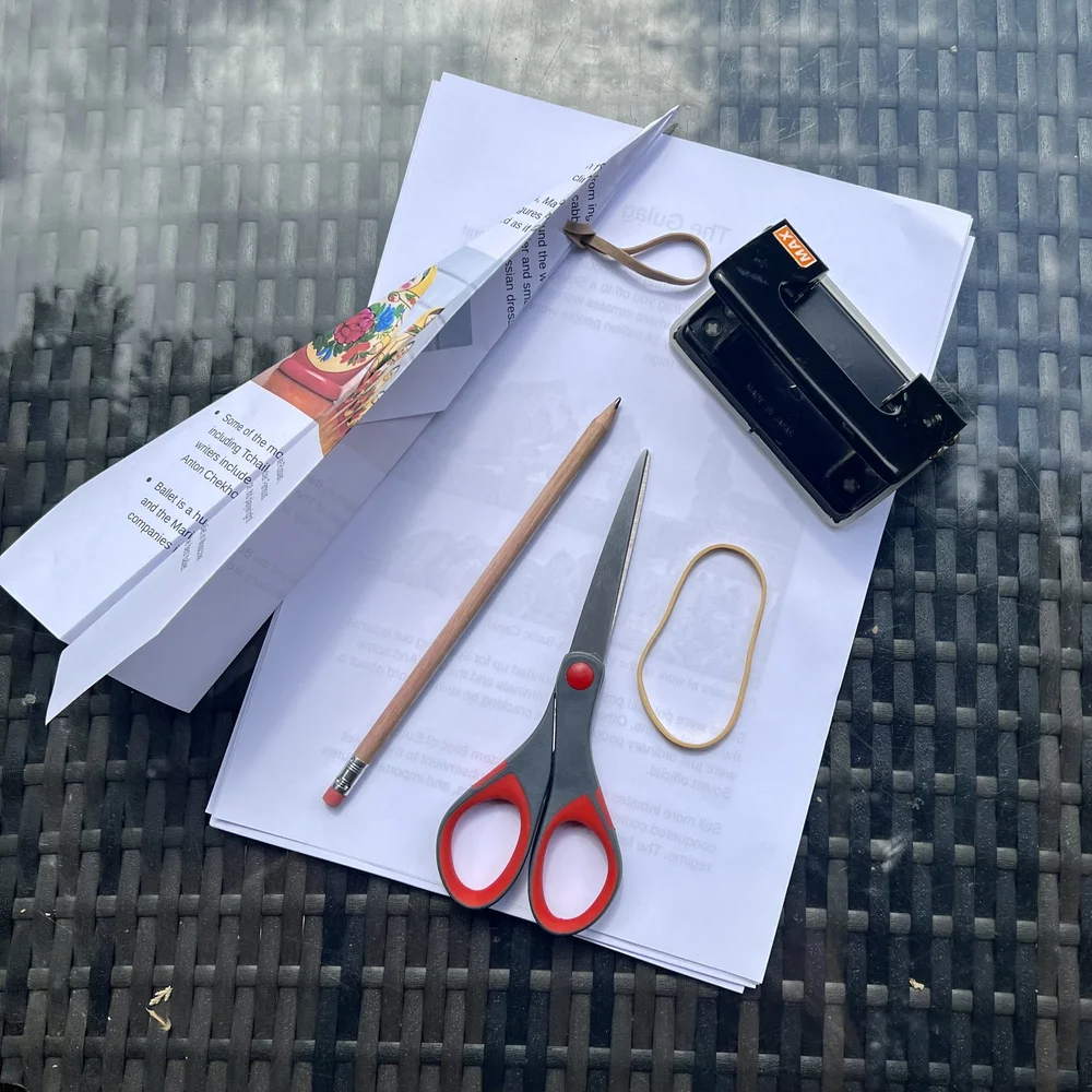 Make a paper aeroplane catapult - Mud & Bloom