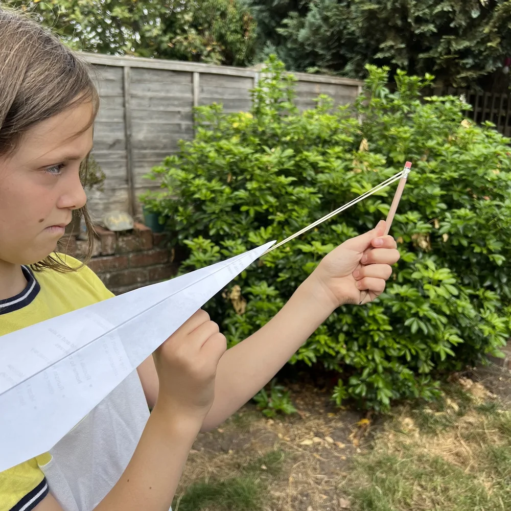 Make a paper aeroplane catapult - Mud & Bloom