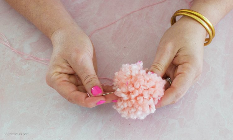 How to Make a Colorful Holiday Pom-Pom Garland with Clover's Pom-Pom ...