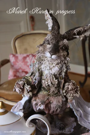 Late, late ! The March hare is as late as a White rabbit ...