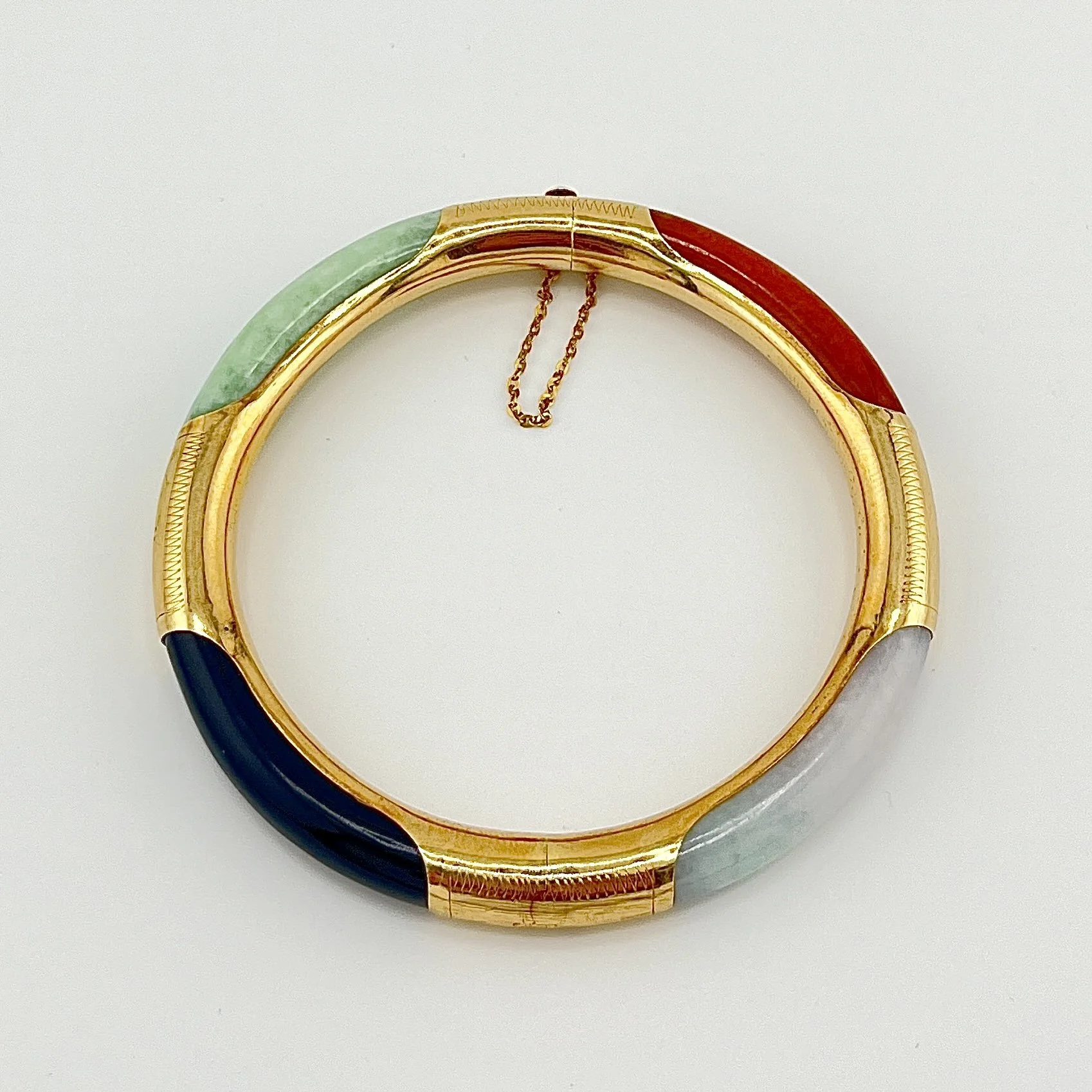 EXQUISITE PAIR: 33CTW OVAL BURMESE RUBY TENNIS BRACELETS IN 21K YELLOW ...