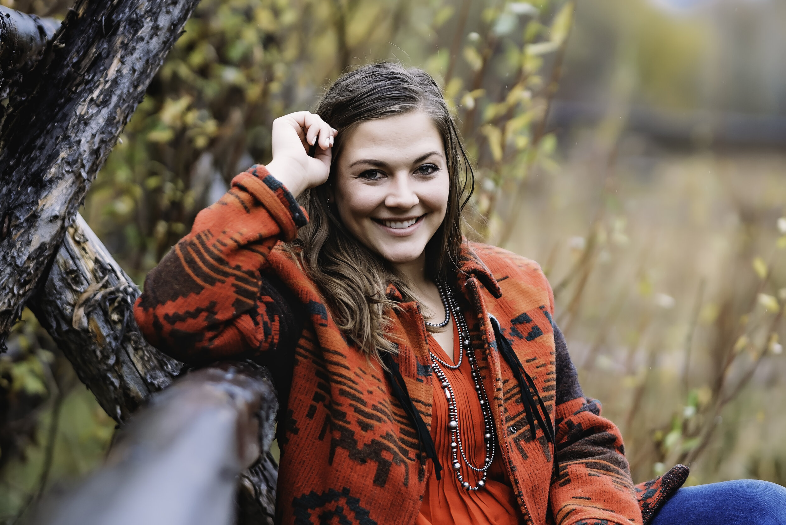 Emily Wears | Auctioneer • Musician • Leather Artist
