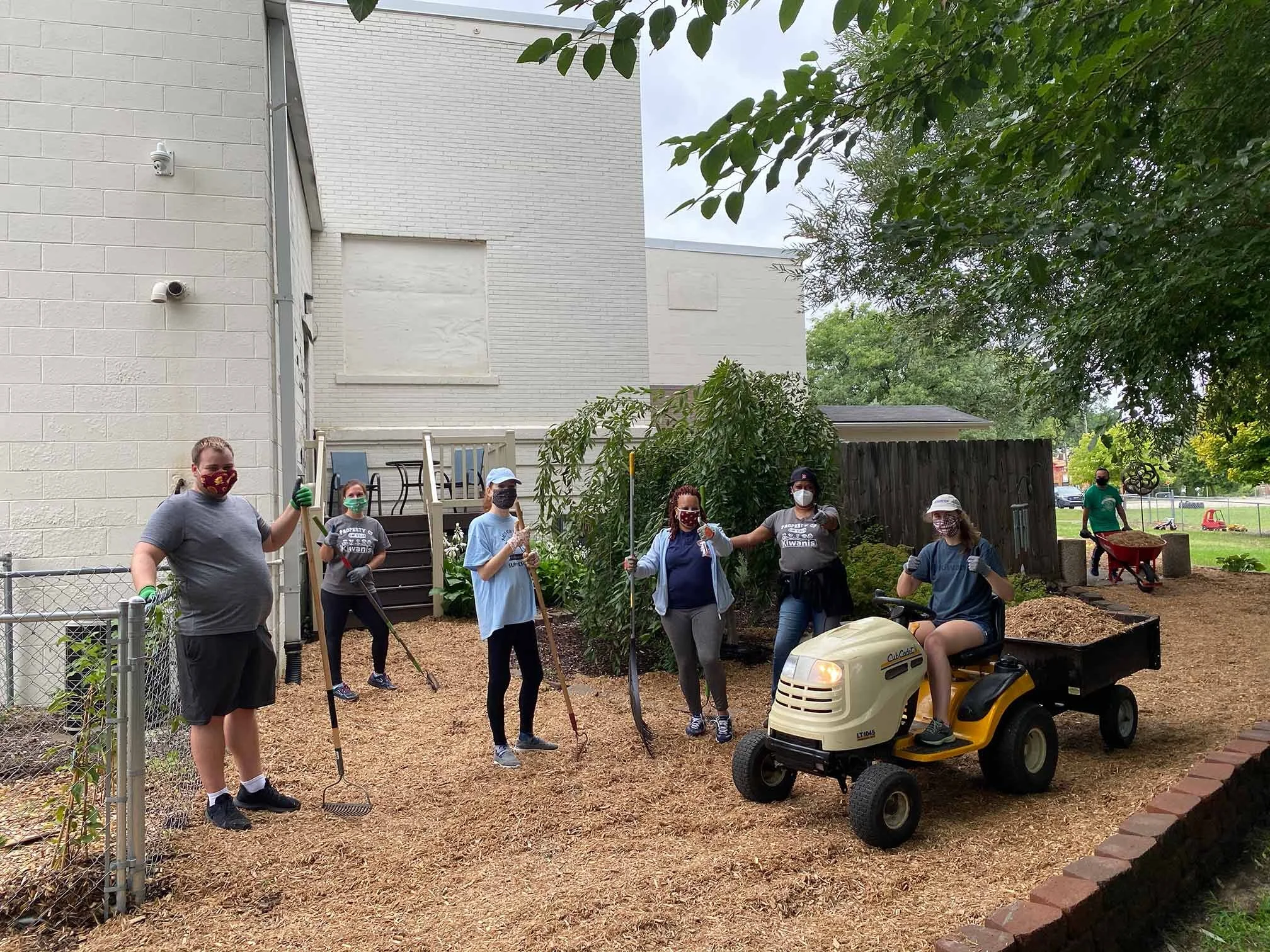 Kiwanis volunteers spruce up natural playground at Pontiac Children's ...